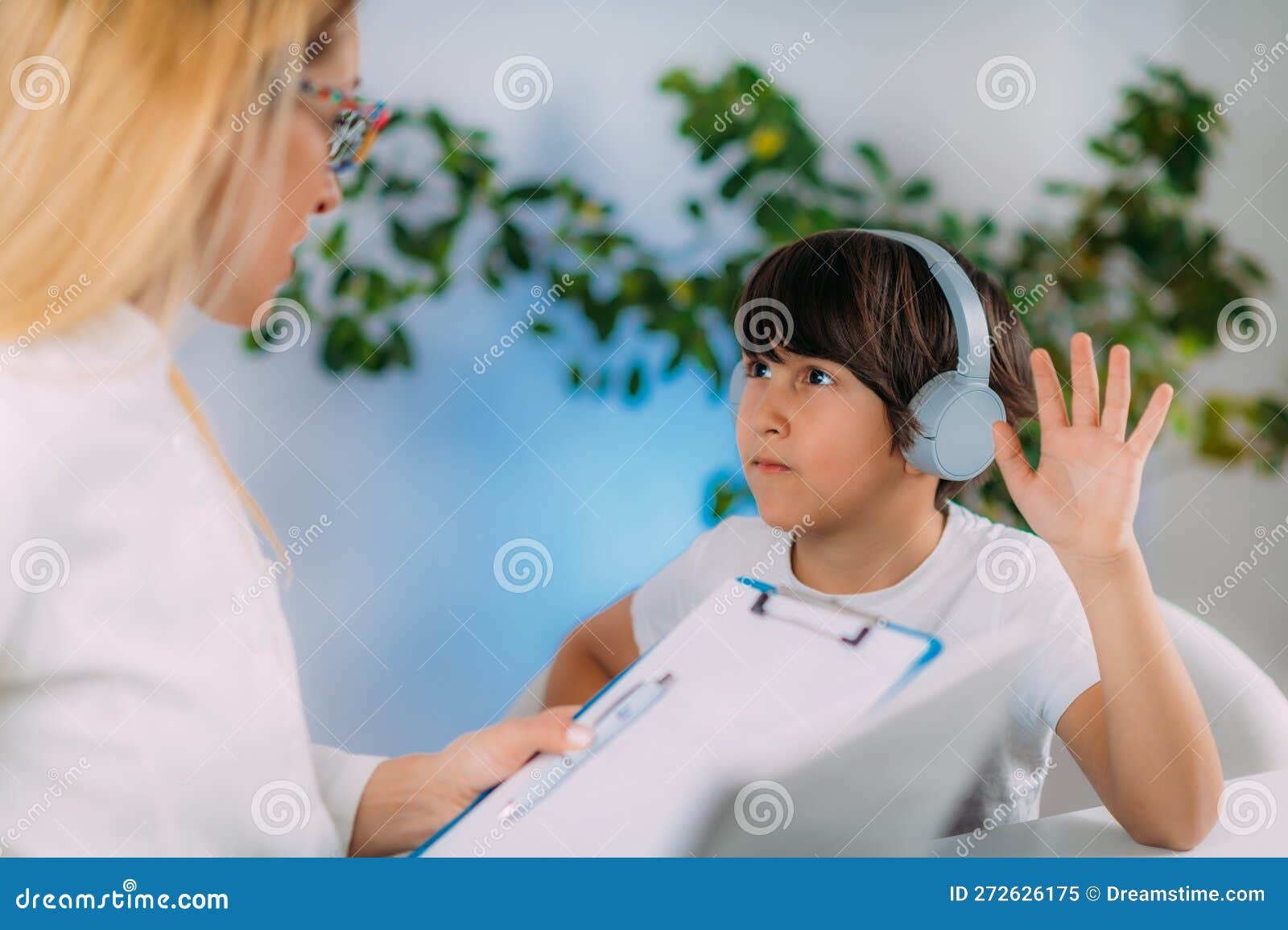 Hearing Test for Children. Audiologist Working with a Preschooler Boy ...