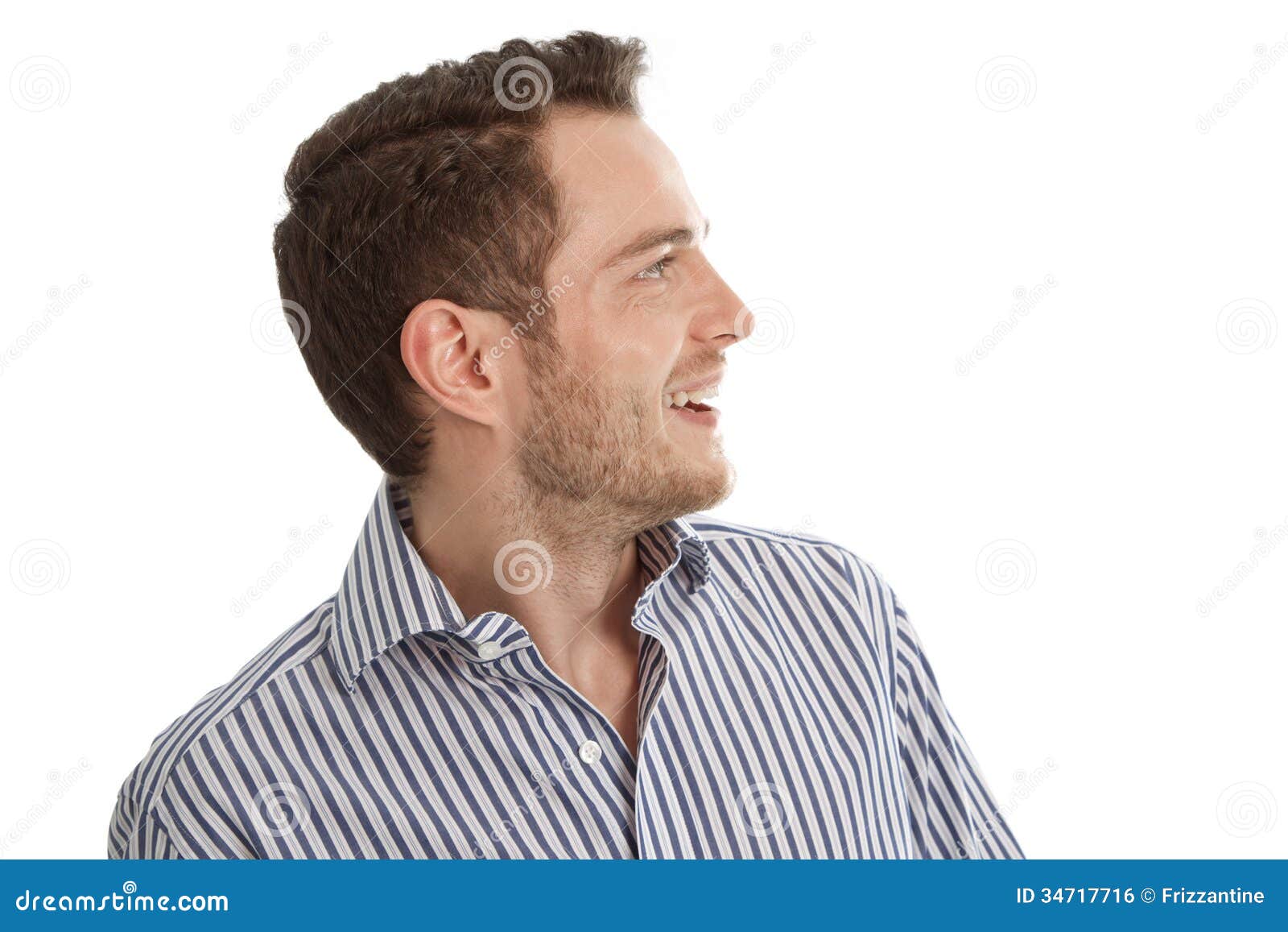 Hearing - Young Man in Blue Shirt Looking Sideways Isolated on W Stock ...