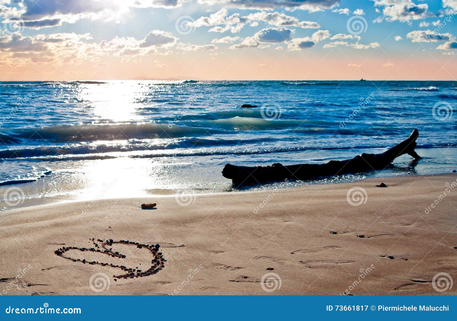 A Heart on the Beach at Sunset Stock Image - Image of beach, couple ...