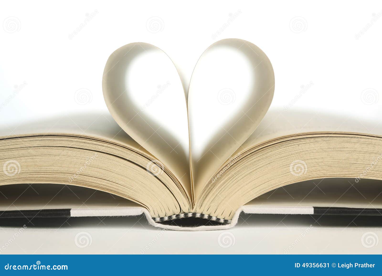Heart in book pages stock image. Image of folded, paper - 49356631
