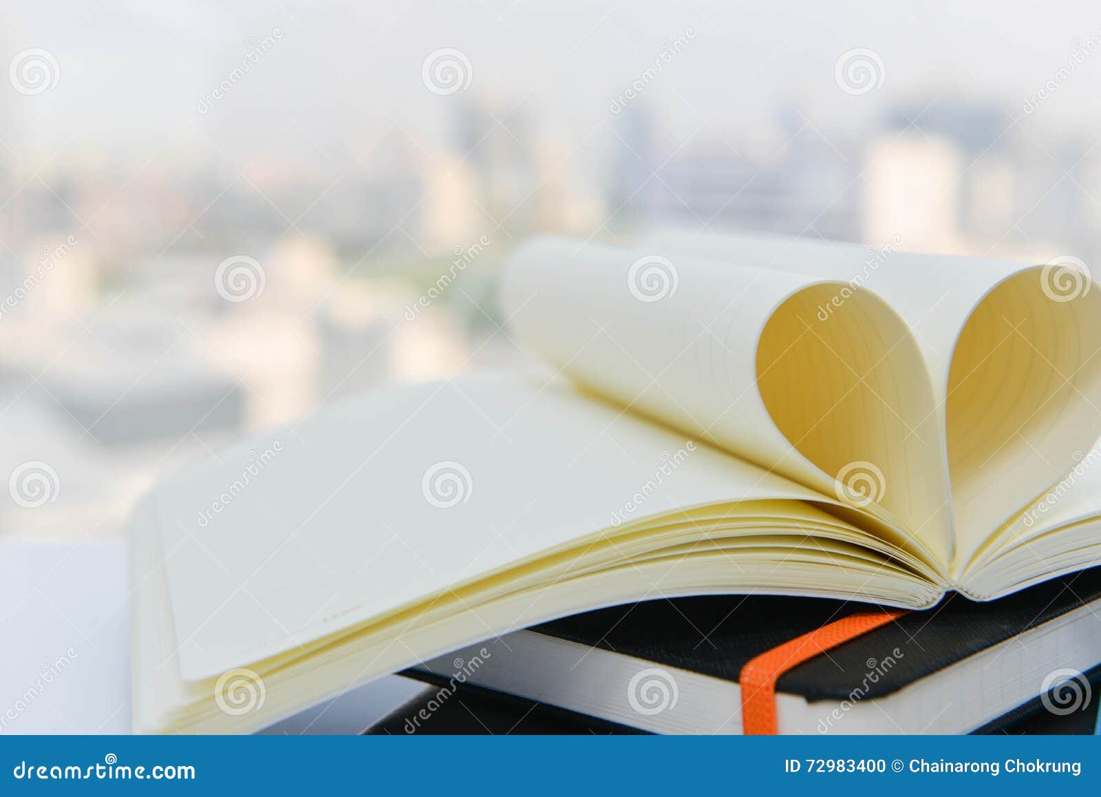 Heart from the book pages stock photo. Image of romance - 72983400