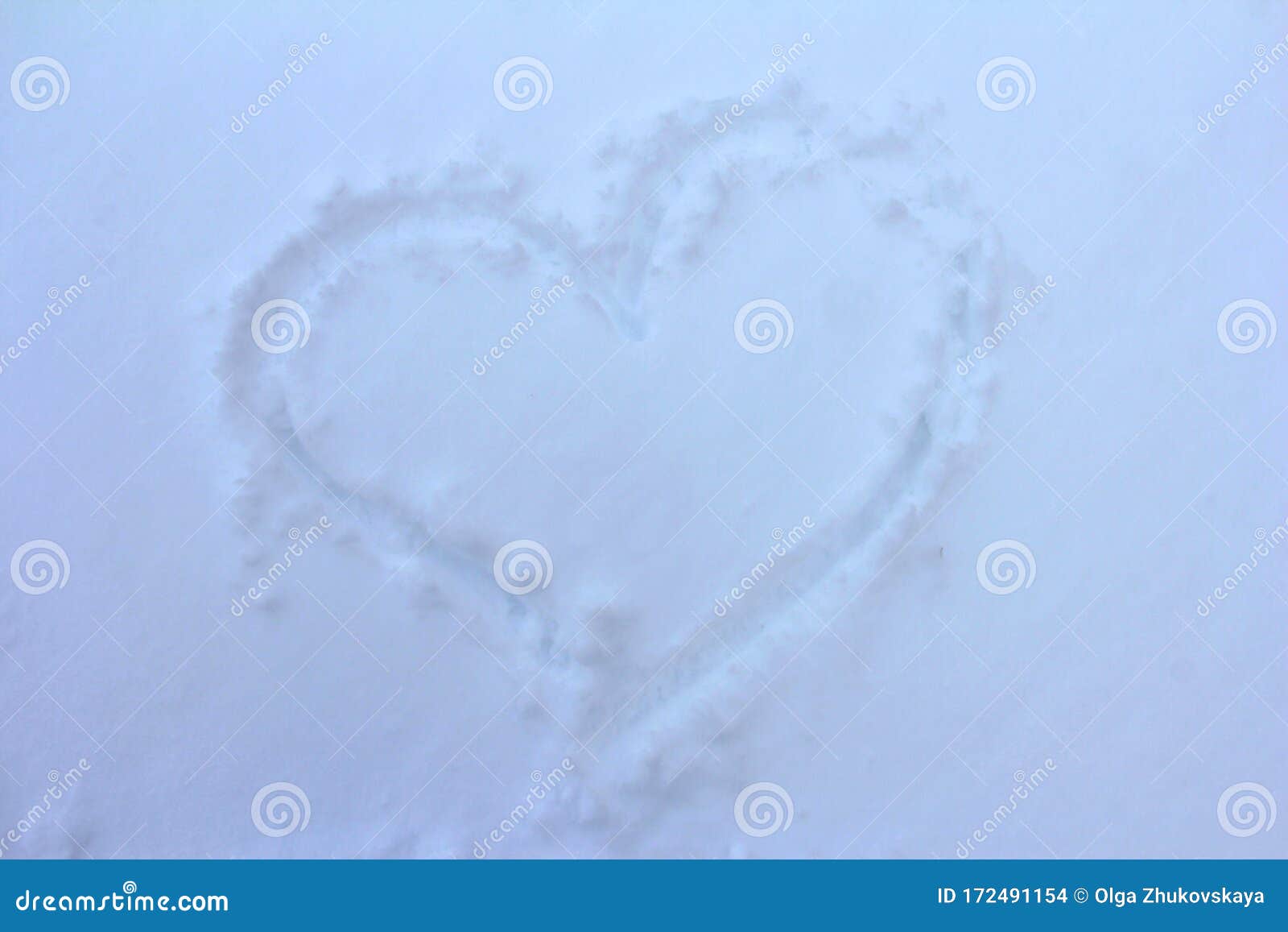 A Heart Drawn in the Snow. Love Symbol on a Snowdrift Stock Photo ...