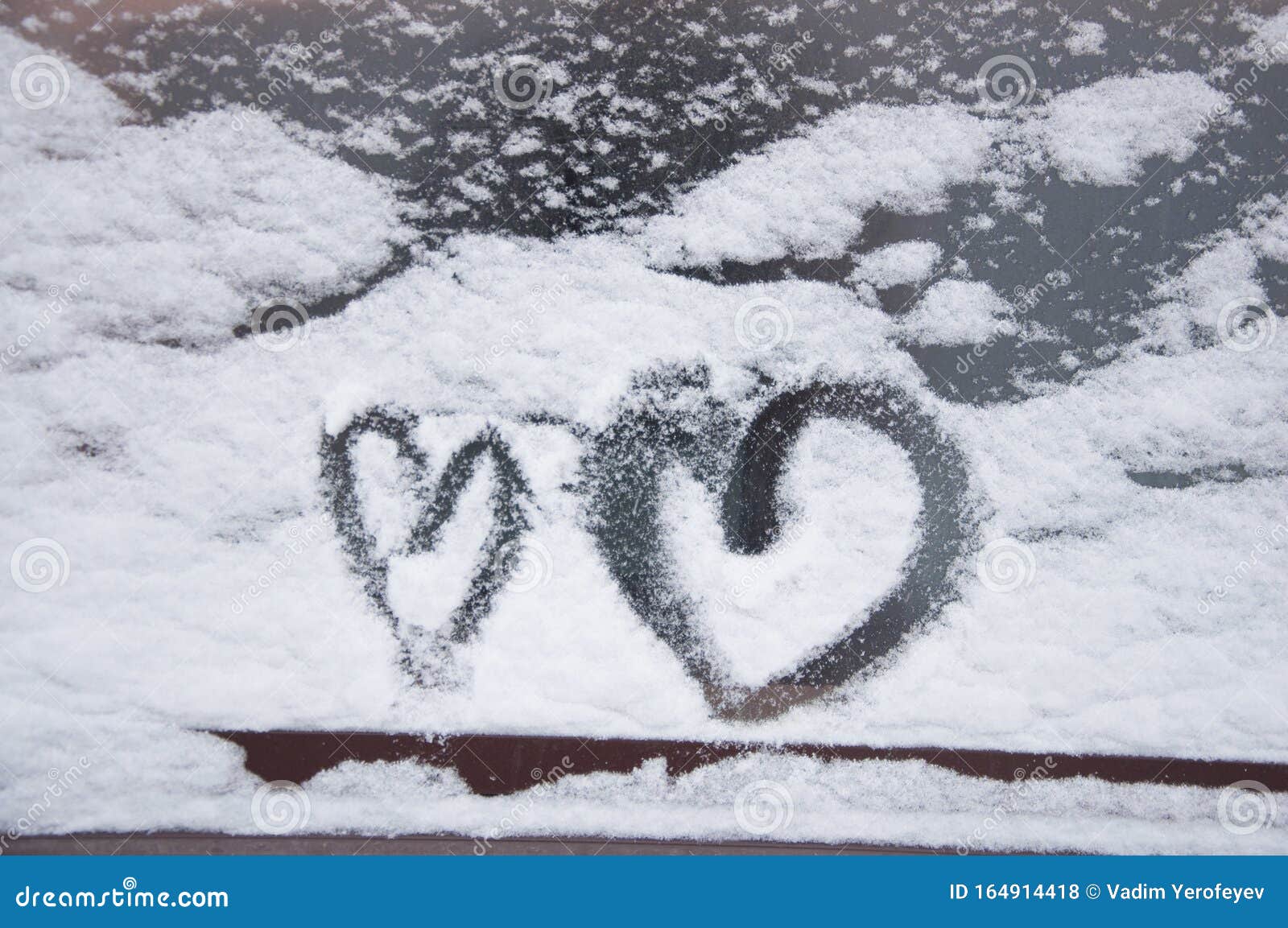 A Heart is Drawn in the Snow Stock Photo - Image of symbol, sign: 164914418