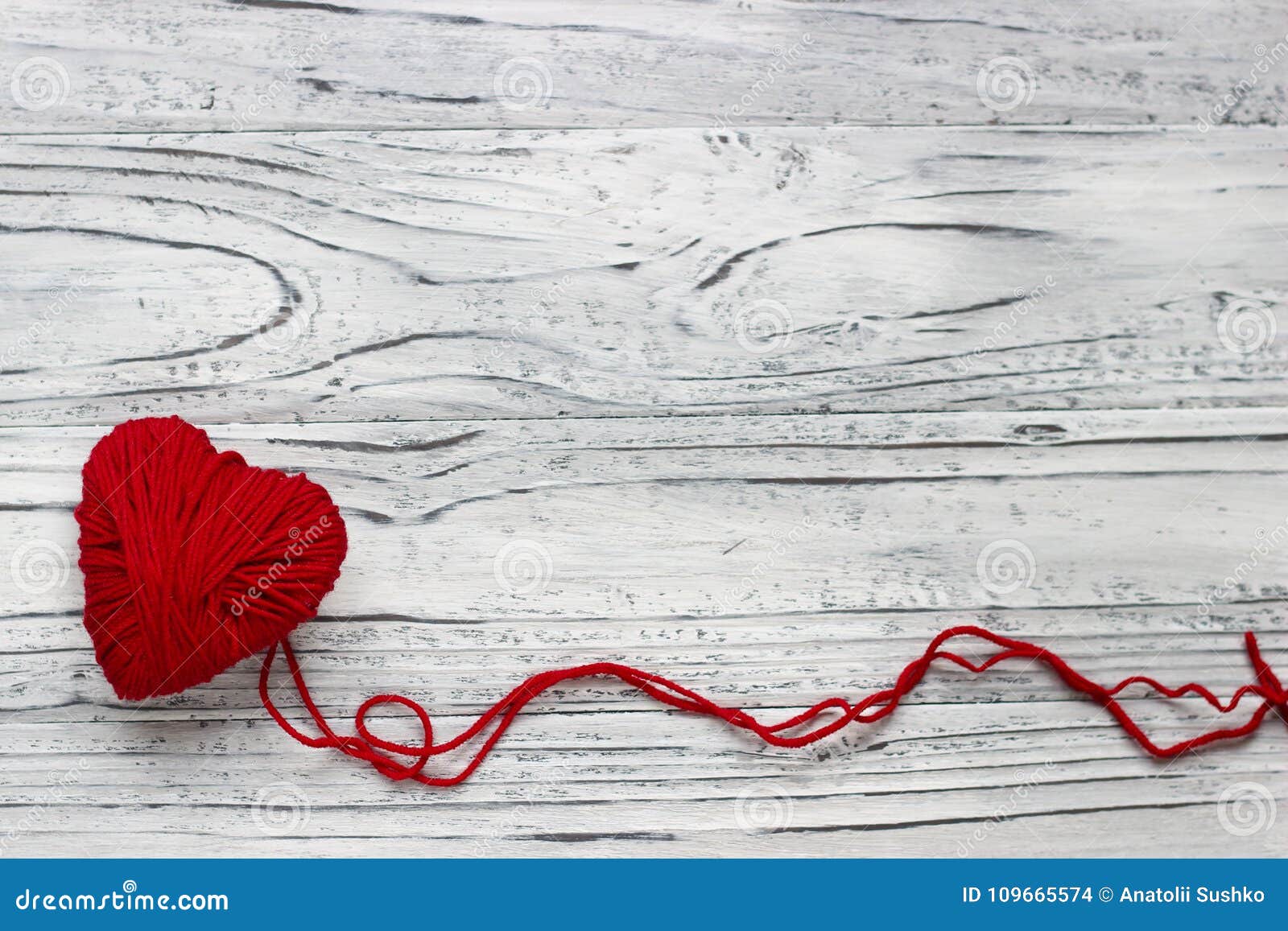 Heart in the Form of a String of Threads from Which a Red Sweater Knits ...