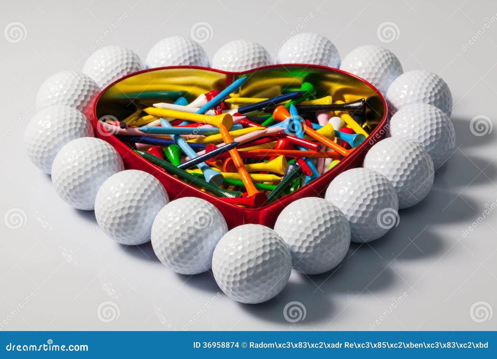 Heart of Golf Balls and Tees Stock Photo - Image of balls, table: 36958874