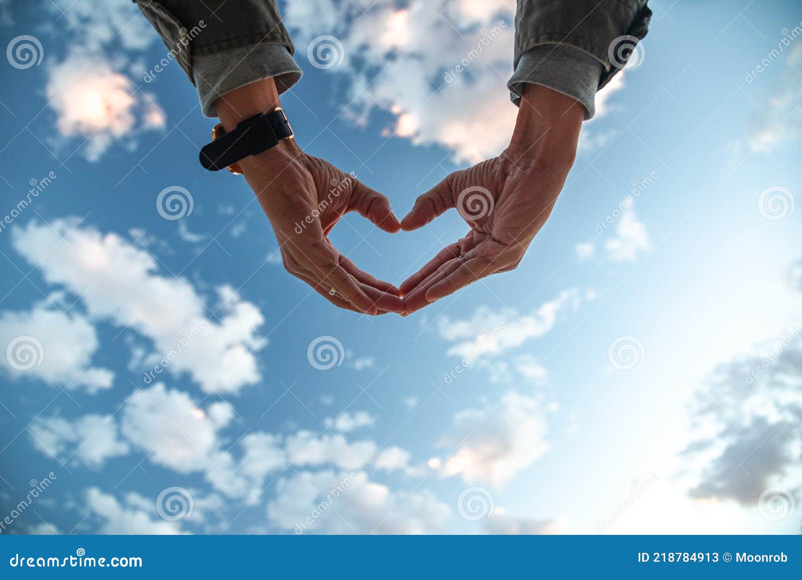 Heart of hand in the sky stock image. Image of hand - 218784913