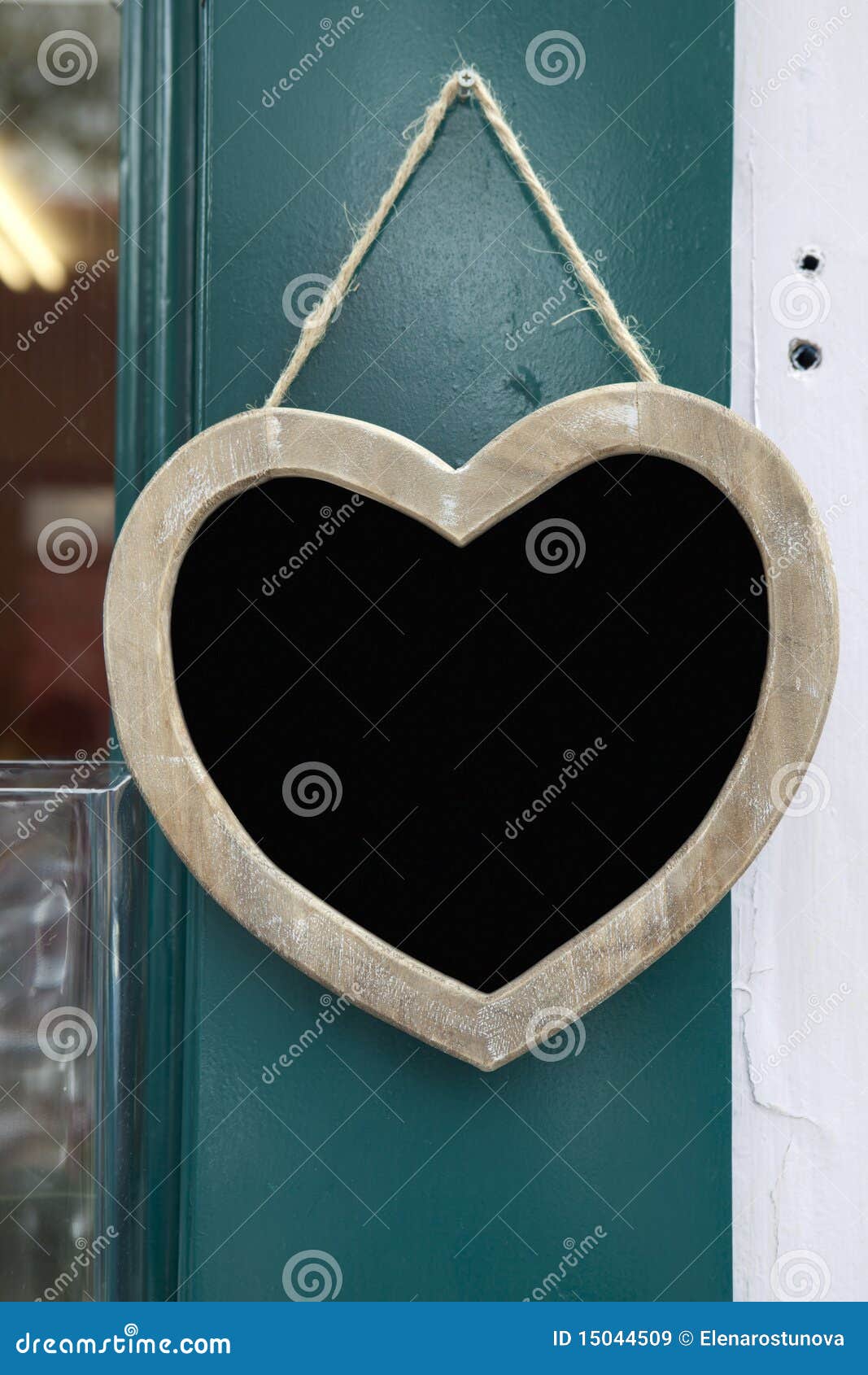 Heart hanging on door shop stock image. Image of leaf - 15044509