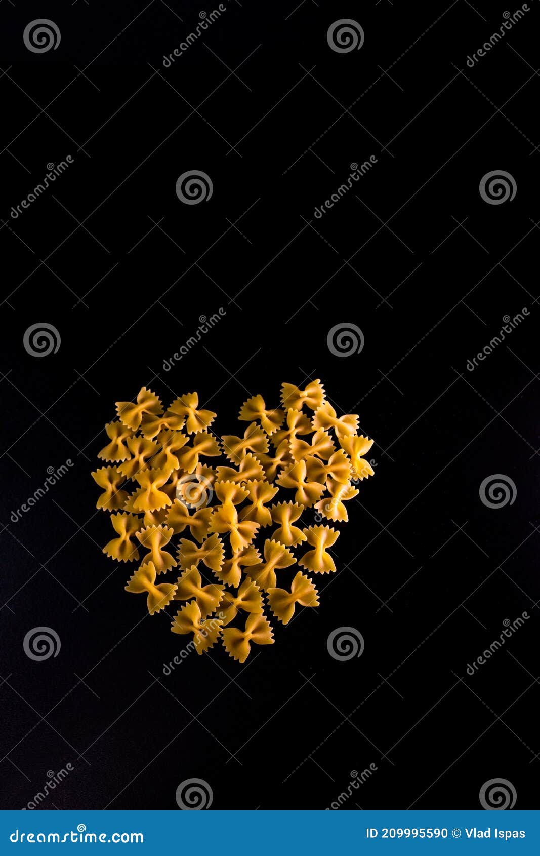 Heart Made of Farfalle Pasta, Dry Pasta in a Heart Shape Stock Photo ...