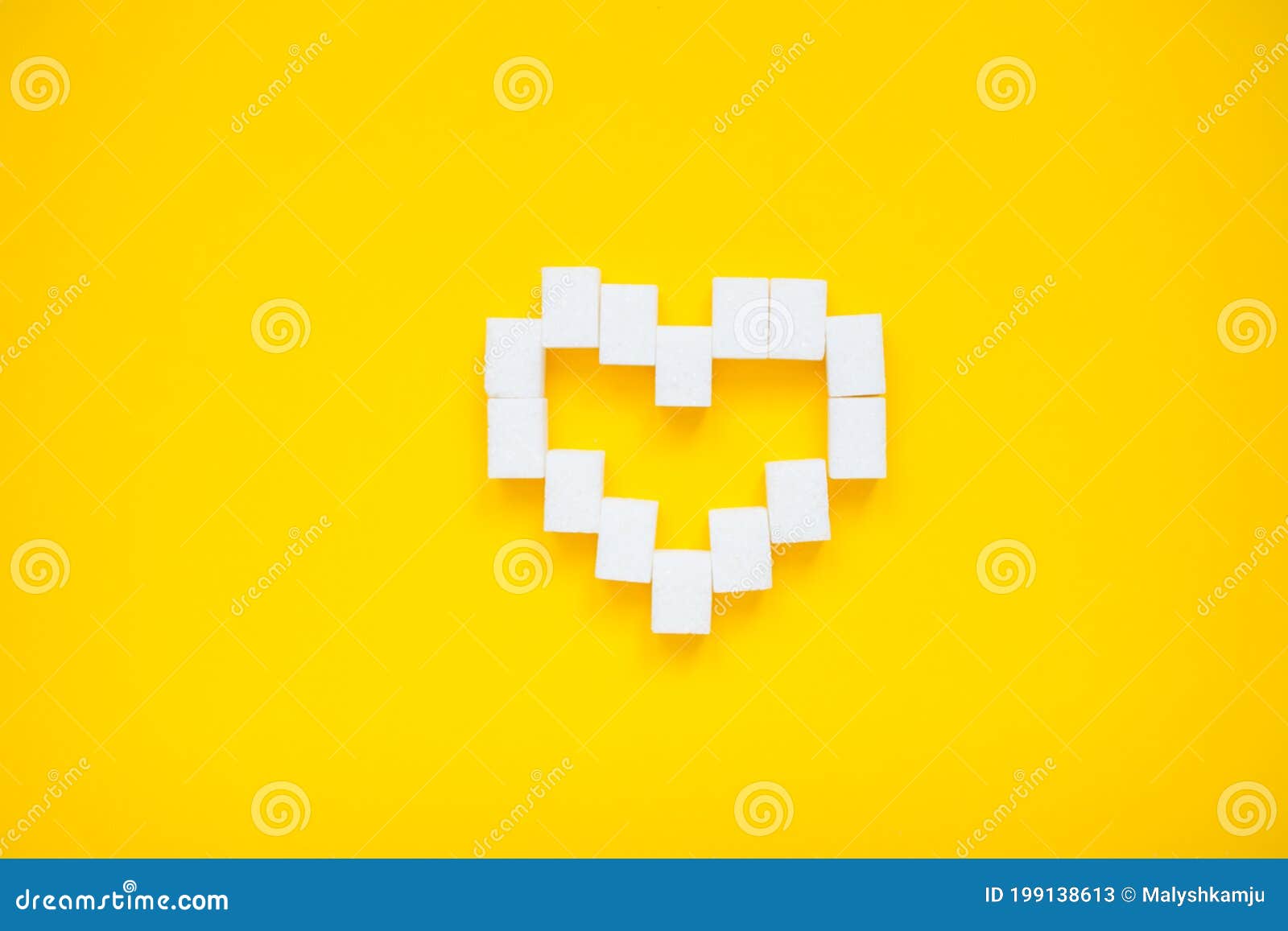 Heart Made of Pressed Sugar Cubes on a Yellow Background Stock Image ...