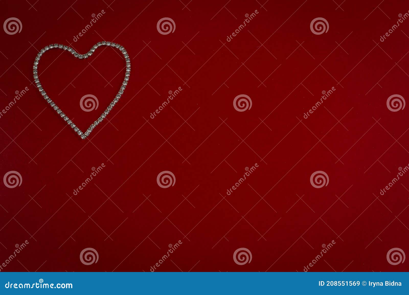 A Heart Made of Rhinestones is Placed on a Bright Red Background Stock ...
