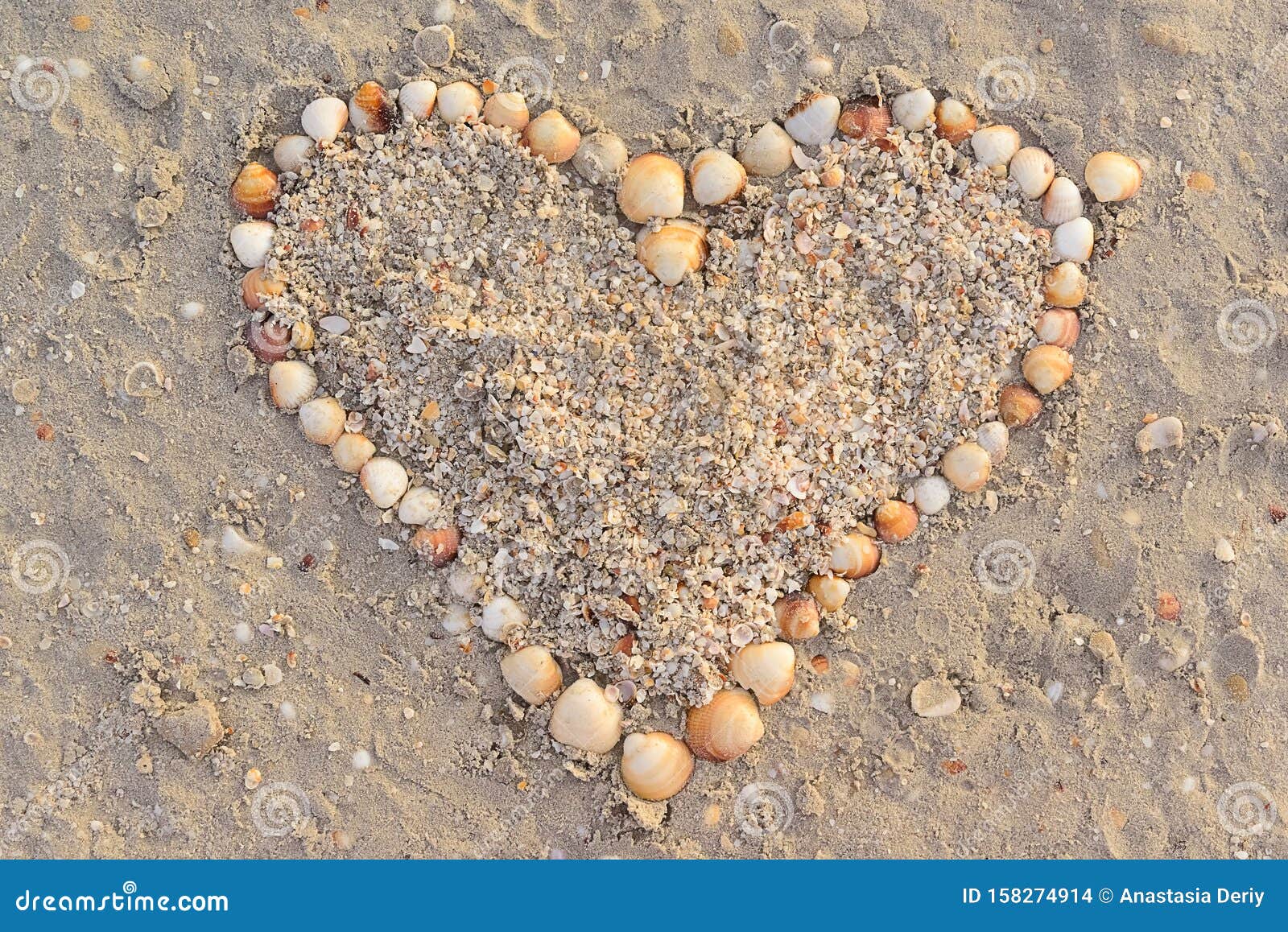 Heart Made of Shells in the Sand Stock Photo - Image of sand, mosaic ...