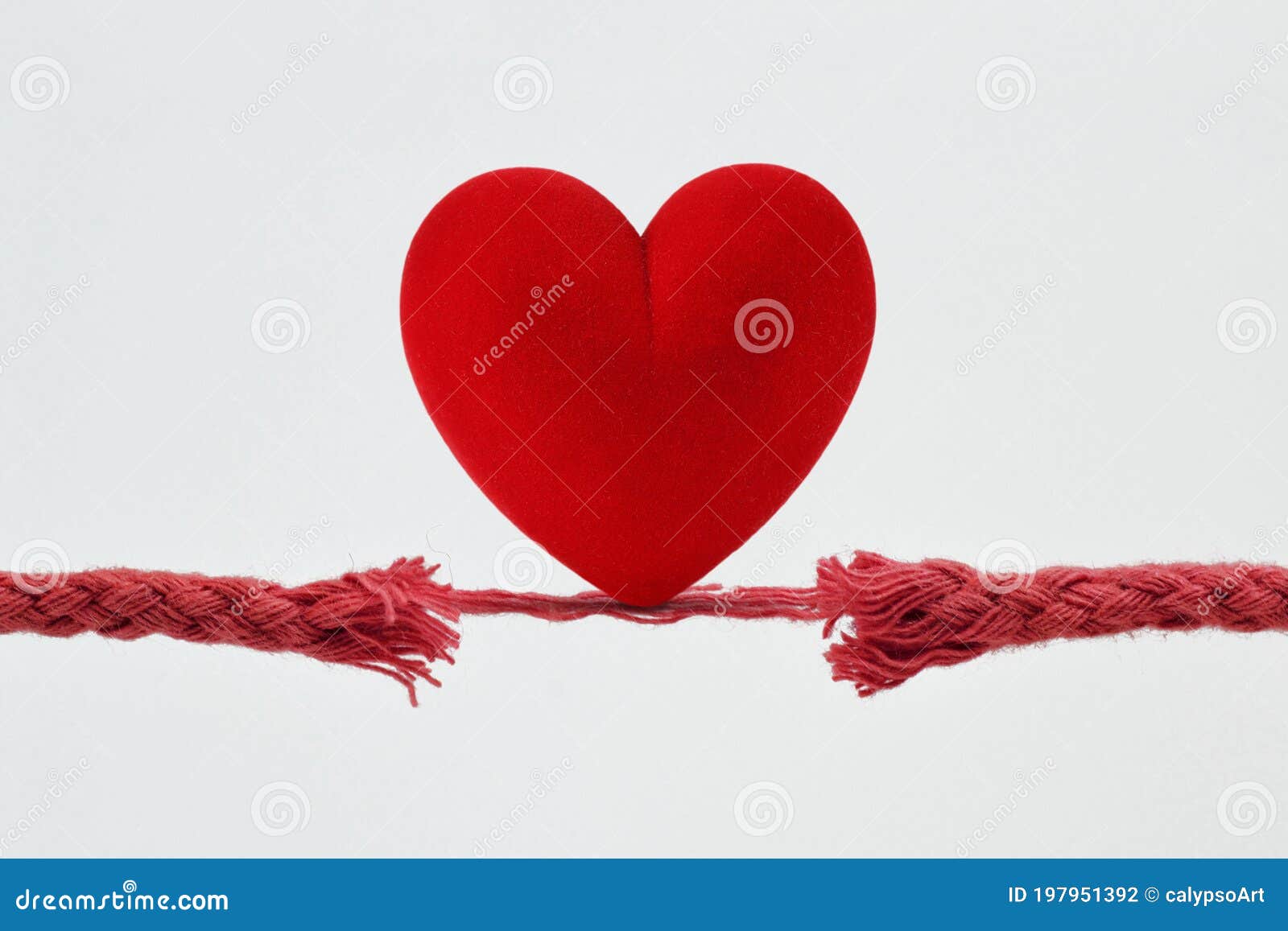 Heart on Nearly Broken Rope - Concept of Love and Risk Stock Photo ...