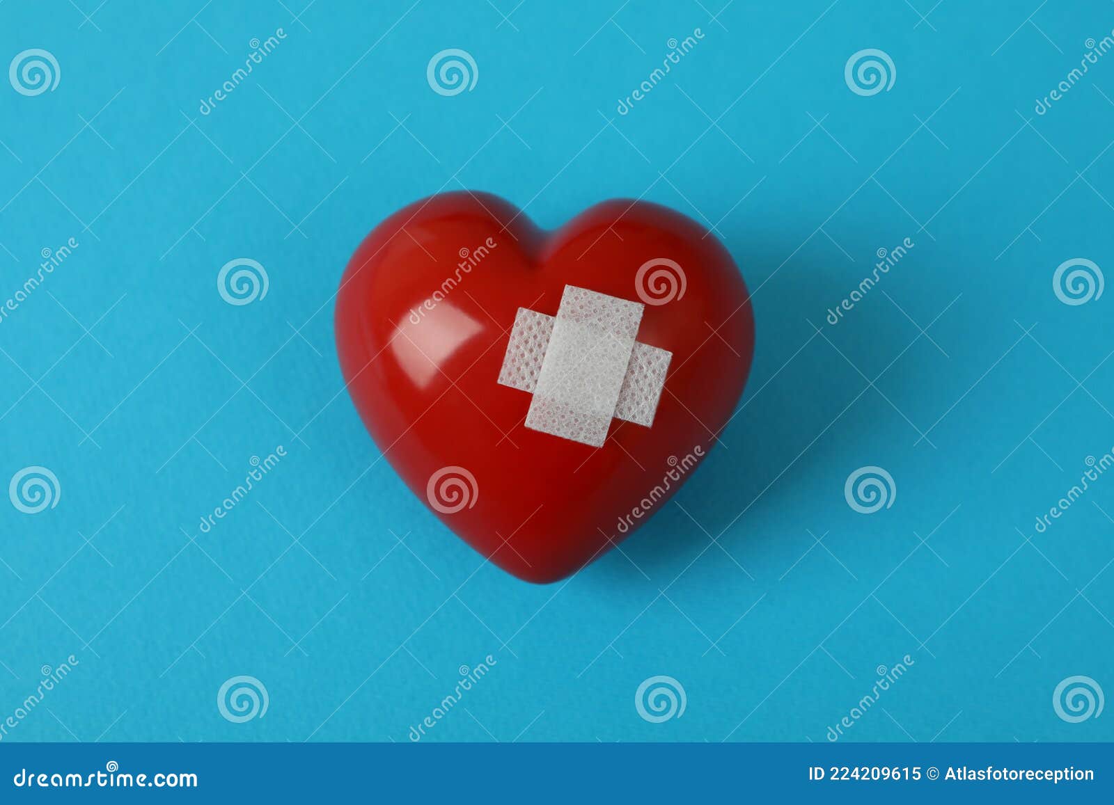 Heart with Patch on Blue Background, Close Up Stock Image - Image of ...
