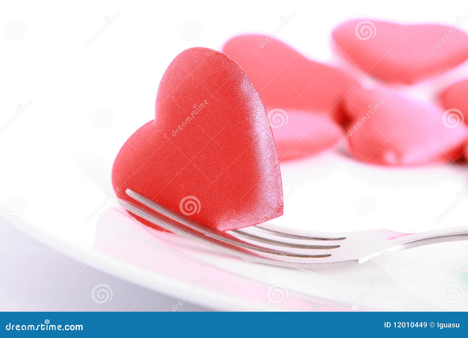 Heart pierced by fork stock image. Image of closeup, conceptual - 12010449