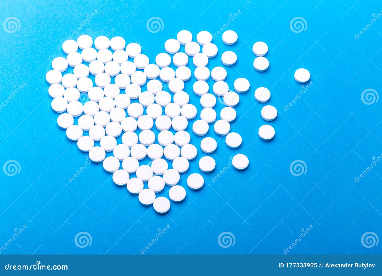 Heart of Pills on a Blue Background Stock Image - Image of drug ...