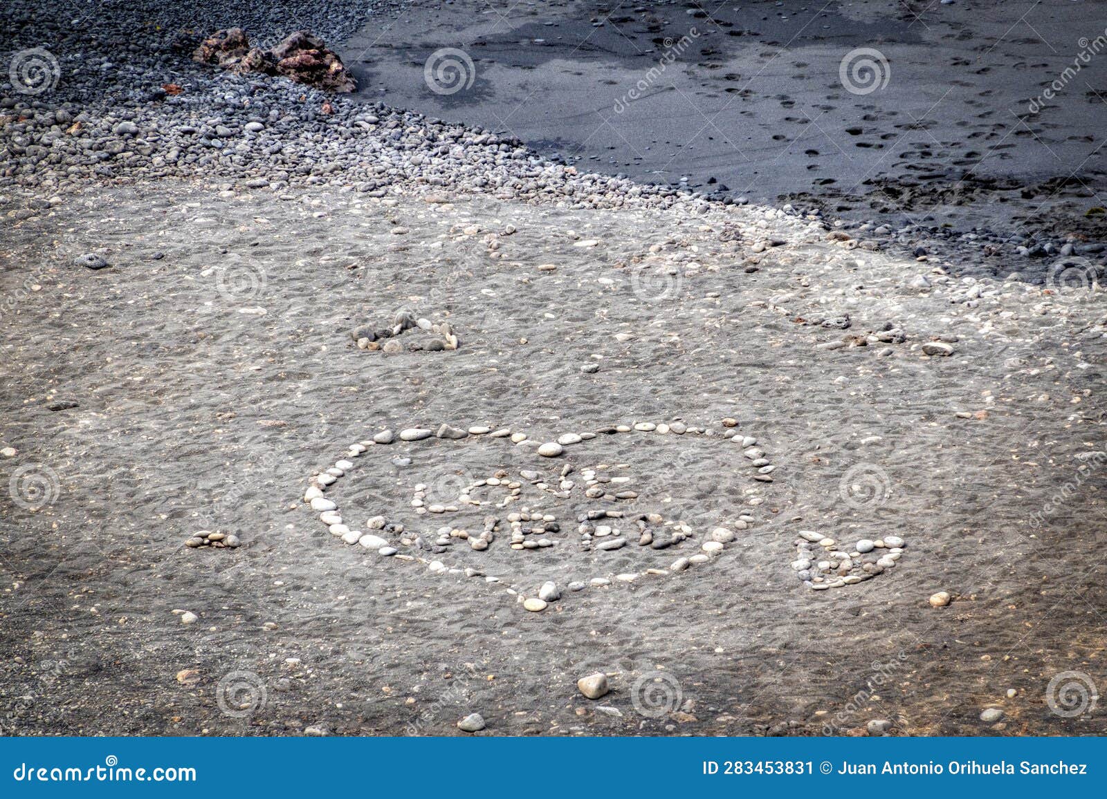 A Heart on the Sand Made with Stones with the Phrase Love Weed Inside ...