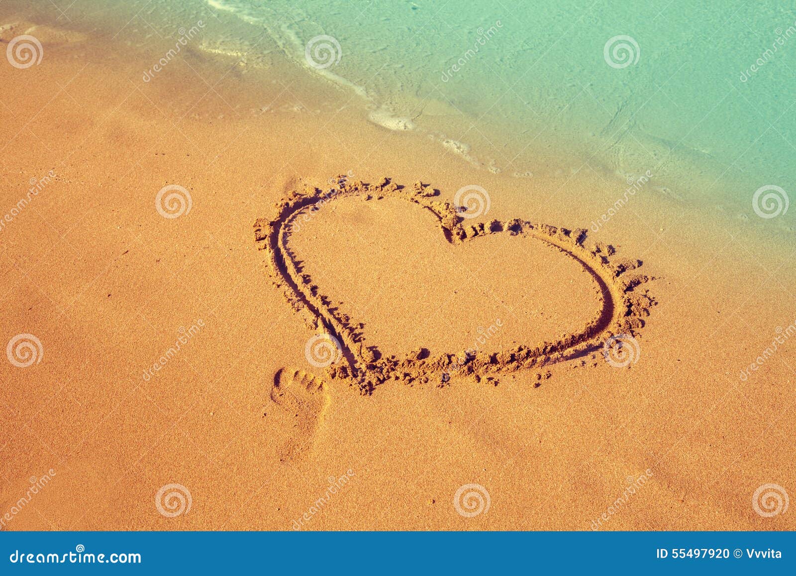 Heart shape on beach sand stock photo. Image of ocean - 55497920