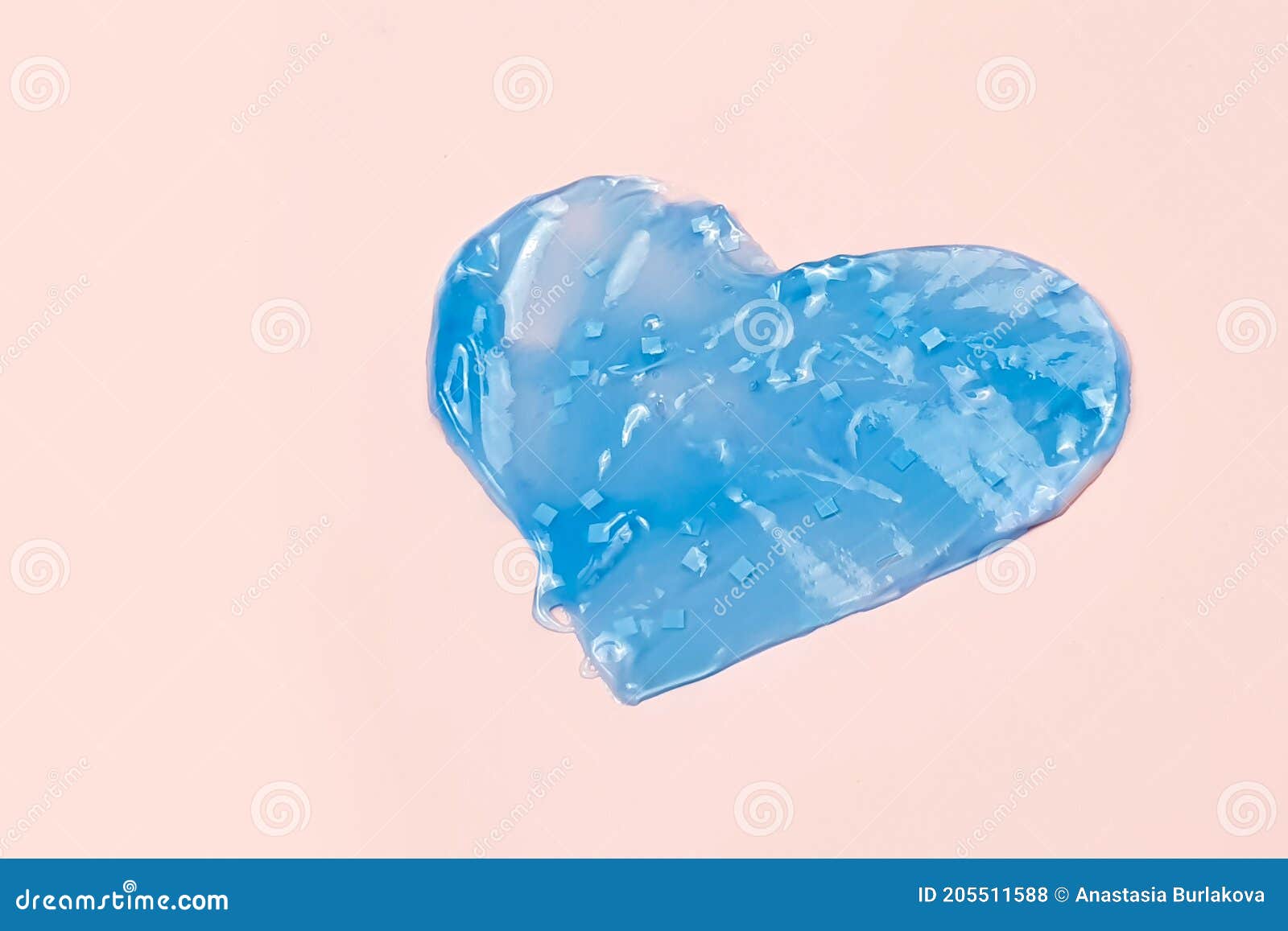 Heart Shape from Blue Cream, Gel or Toothpaste in Pink Background Stock ...