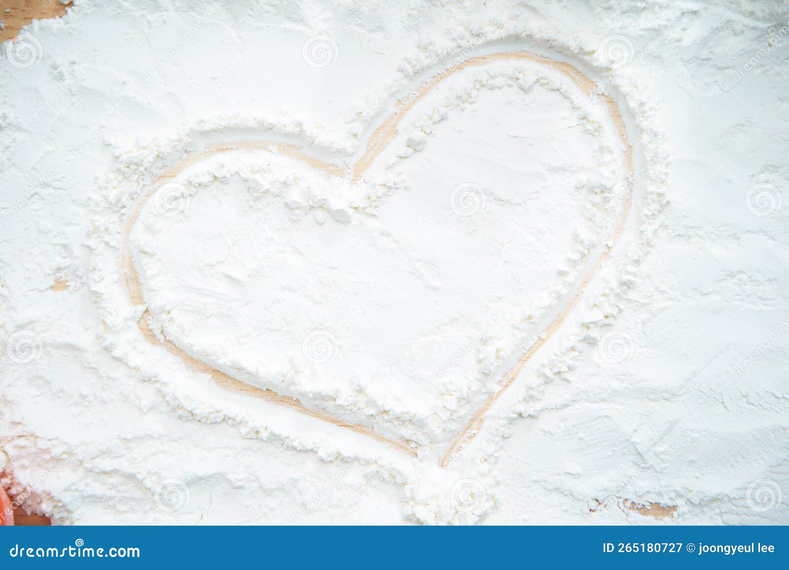Heart shape drawn on flour stock image. Image of cook - 265180727
