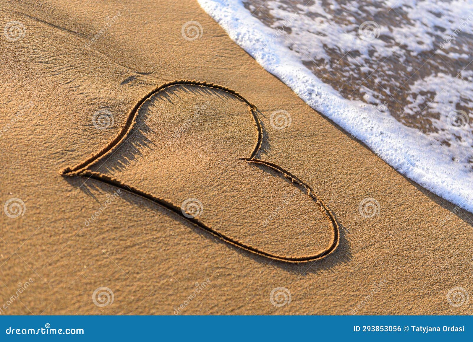 Heart Shape Drawn in the Sand on a Beach Stock Photo - Image of ...