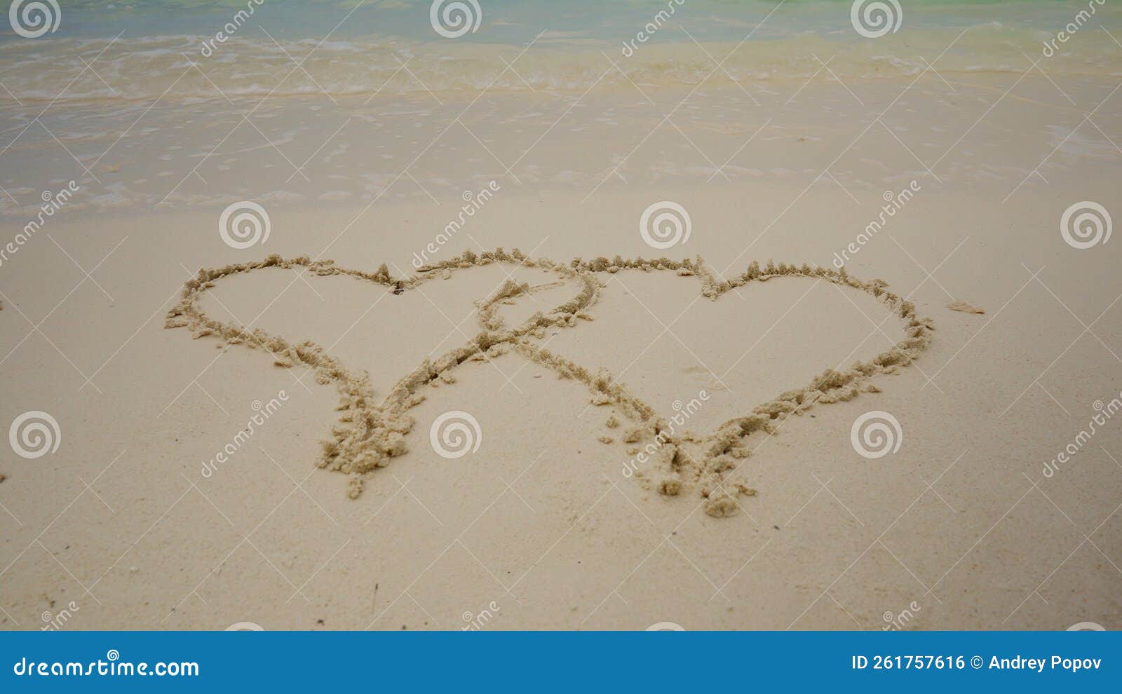 Heart Shape Drawn in Sand stock photo. Image of weekend - 261757616