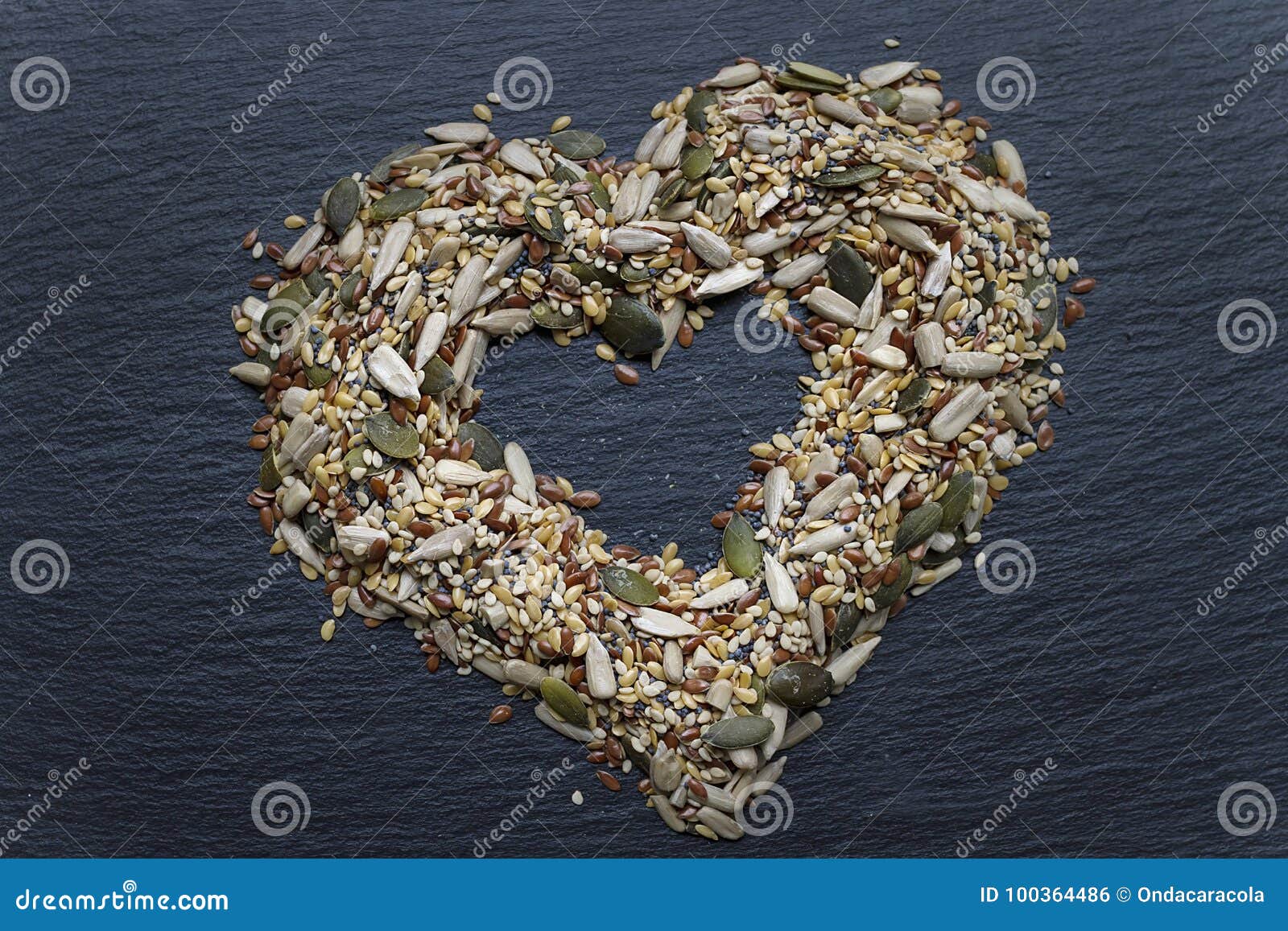 Seeds heart shape stock photo. Image of flavoring, closeup - 100364486