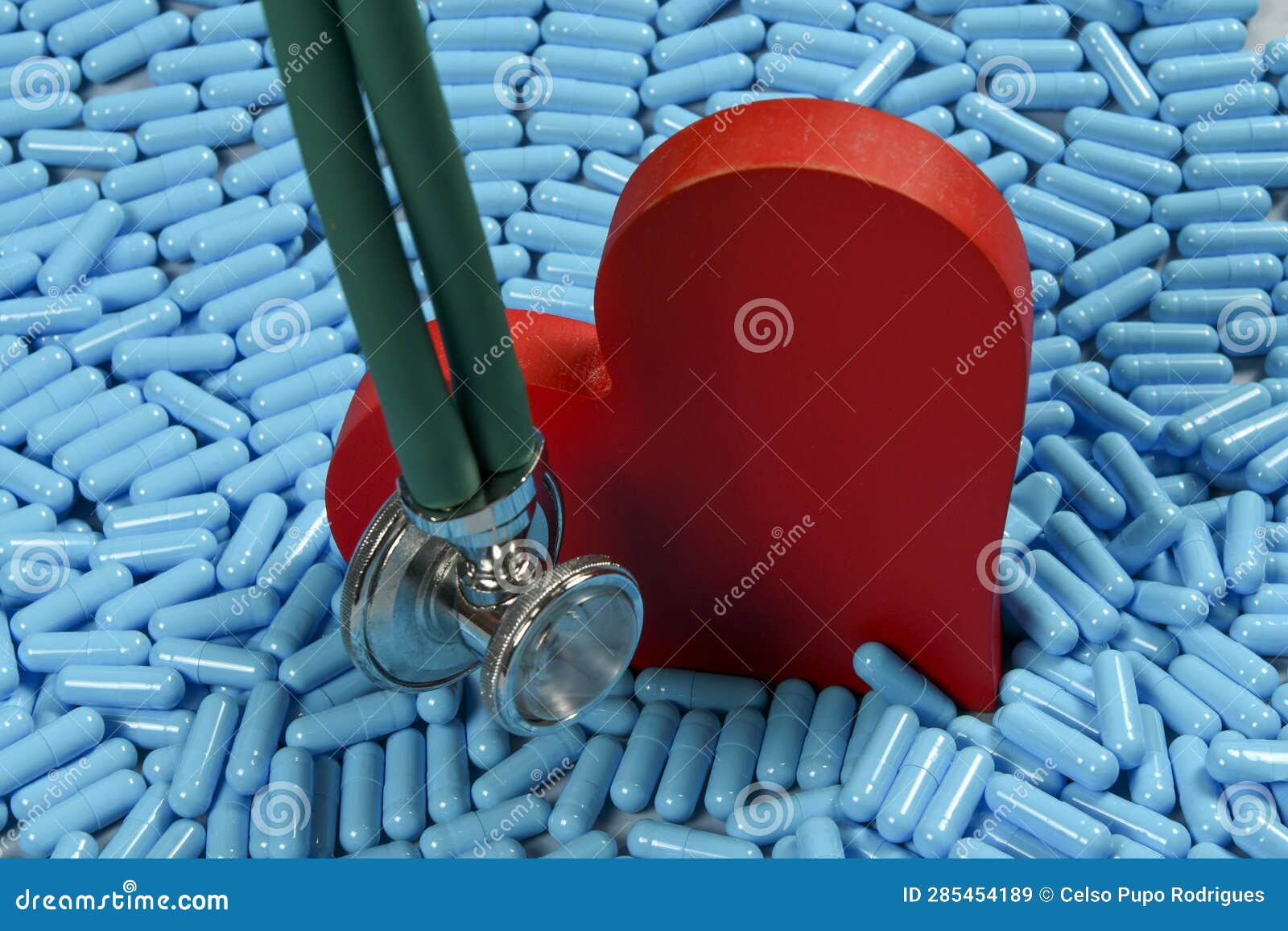 Heart Shape and Medicine Capsules Representing Heart Problems and ...