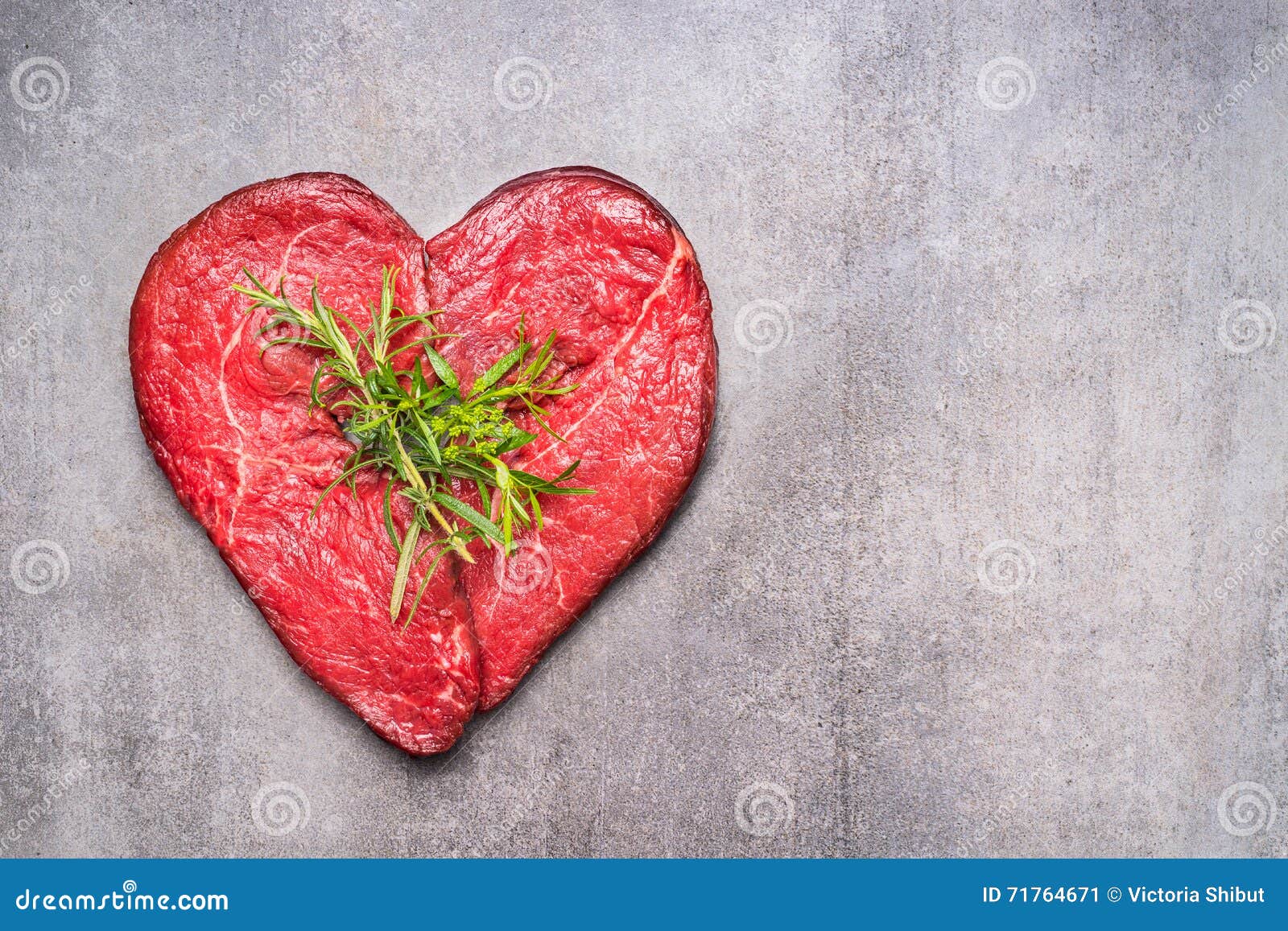 Heart Shape Raw Meat with Herbs and Text on Gray Concrete Background ...