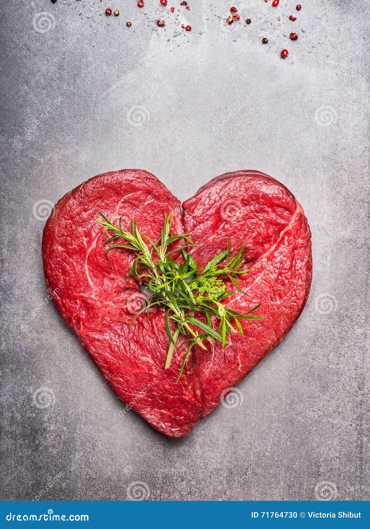 Heart Shape Raw Meat with Herbs and Text on Gray Concrete Background ...