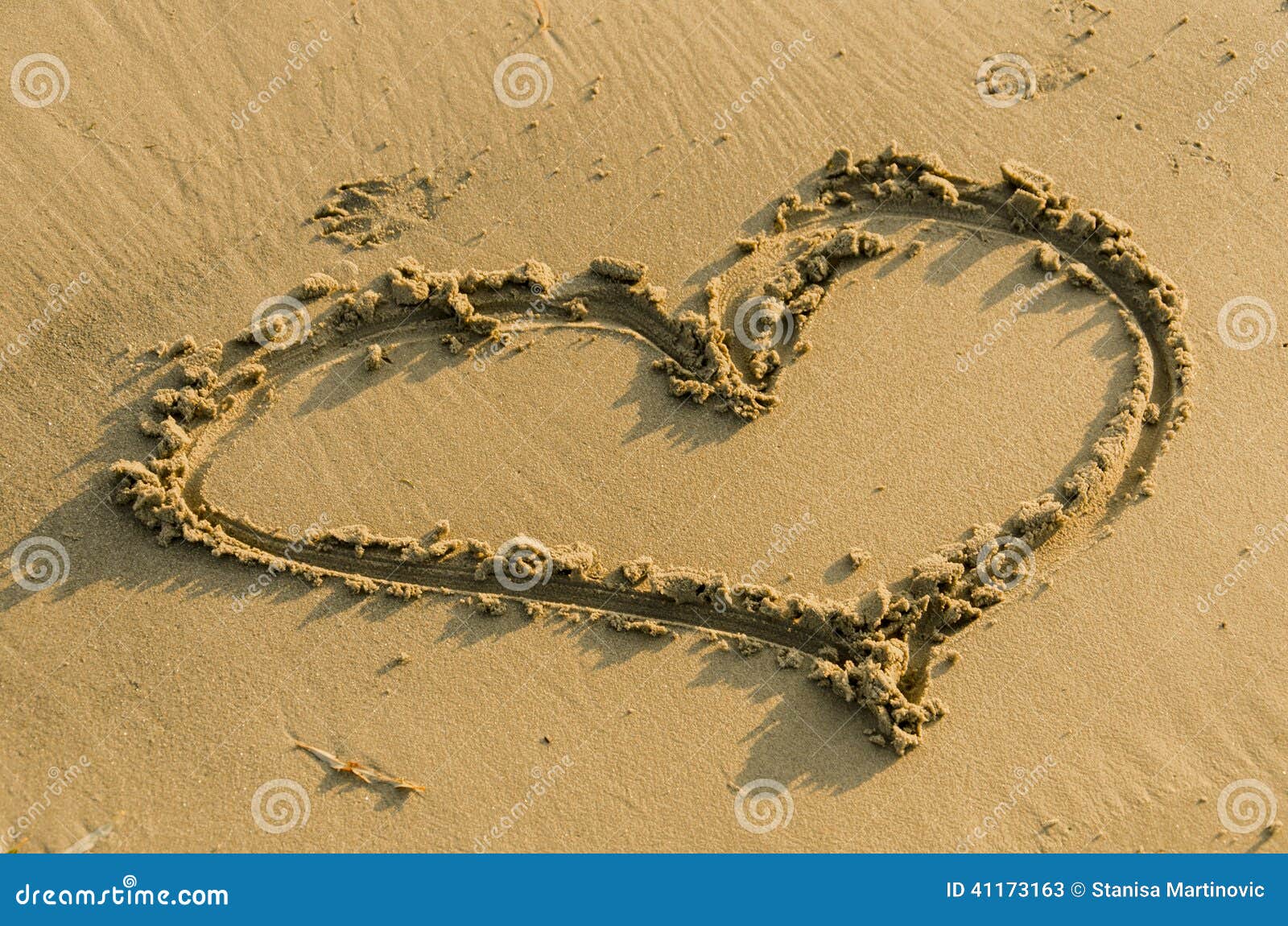 Heart shape in sand stock image. Image of sunny, beautiful - 41173163