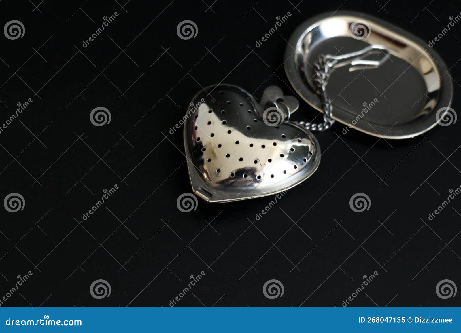 Heart Shape Silver Tea Strainer on Black Background Stock Image - Image ...