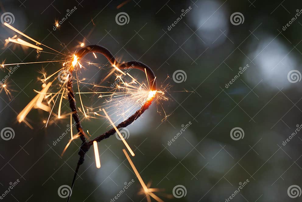 Heart shape sparkler stock photo. Image of black, explosion - 88589540