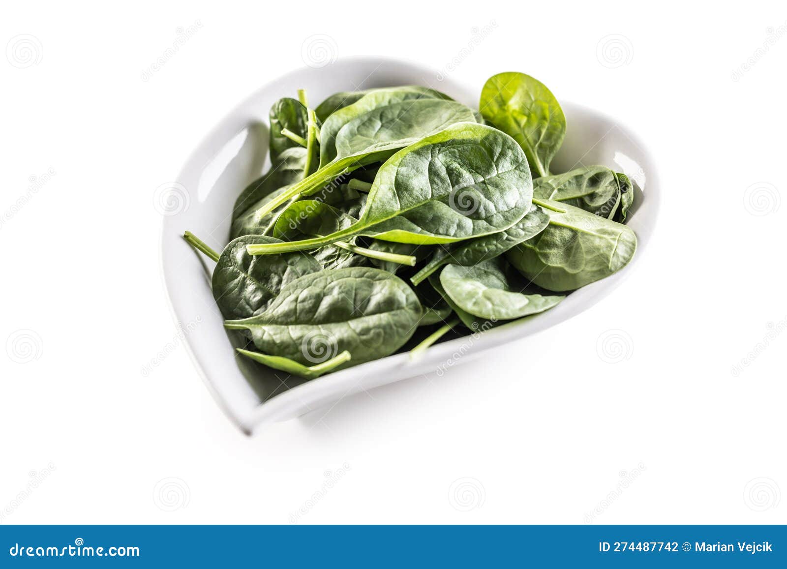 Heart-shaped Bowl of Young Spinach Leaves on an Isolated White ...