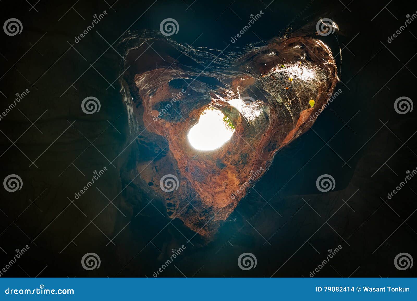 Heart-shaped cave stock photo. Image of mystical, beam - 79082414