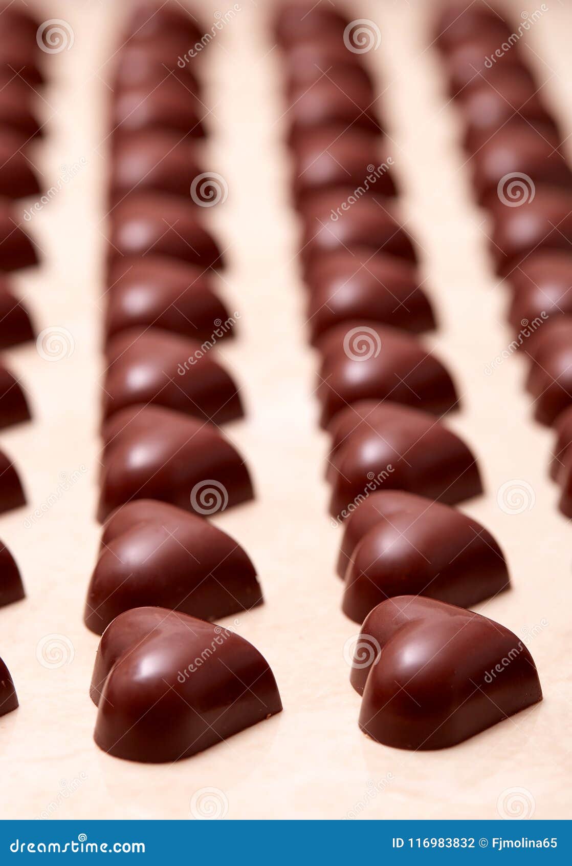 Heart-shaped Chocolates Arranged in Rows Stock Photo - Image of ...