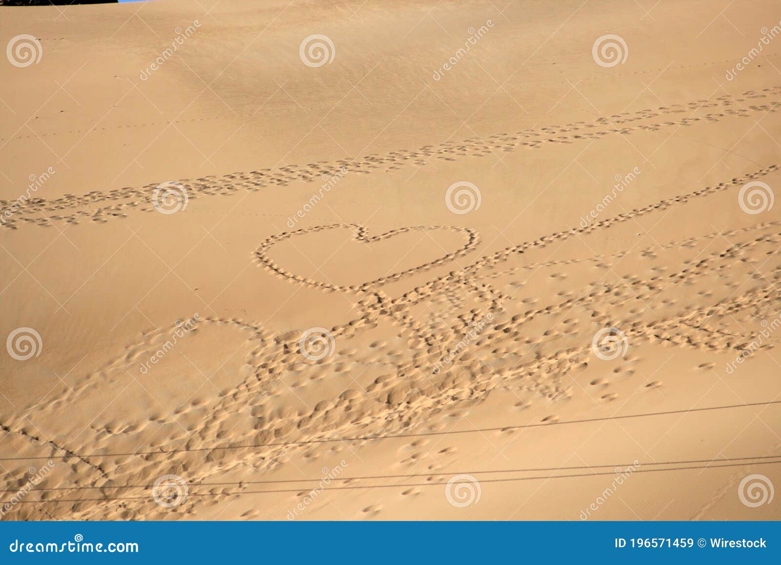 Heart-shaped with Footsteps on the Desert Sand Stock Image - Image of ...