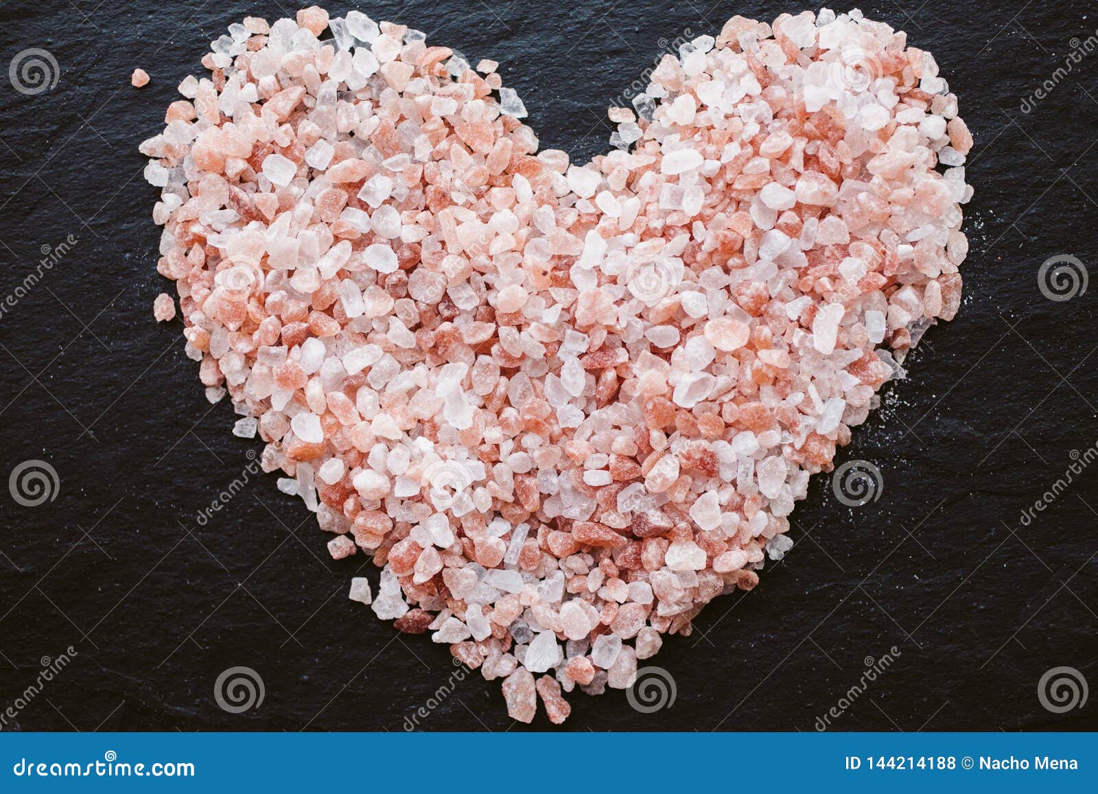 Heart Shaped Himalayan Salt on Board Background. Top View Stock Photo ...