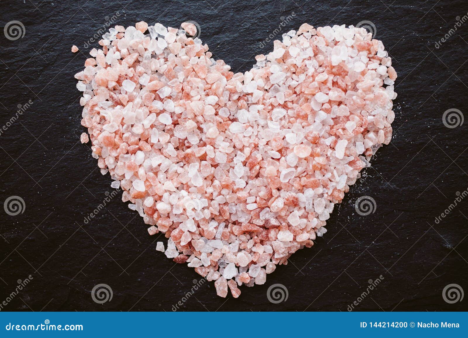 Heart Shaped Himalayan Salt on Board Background. Top View Stock Photo ...