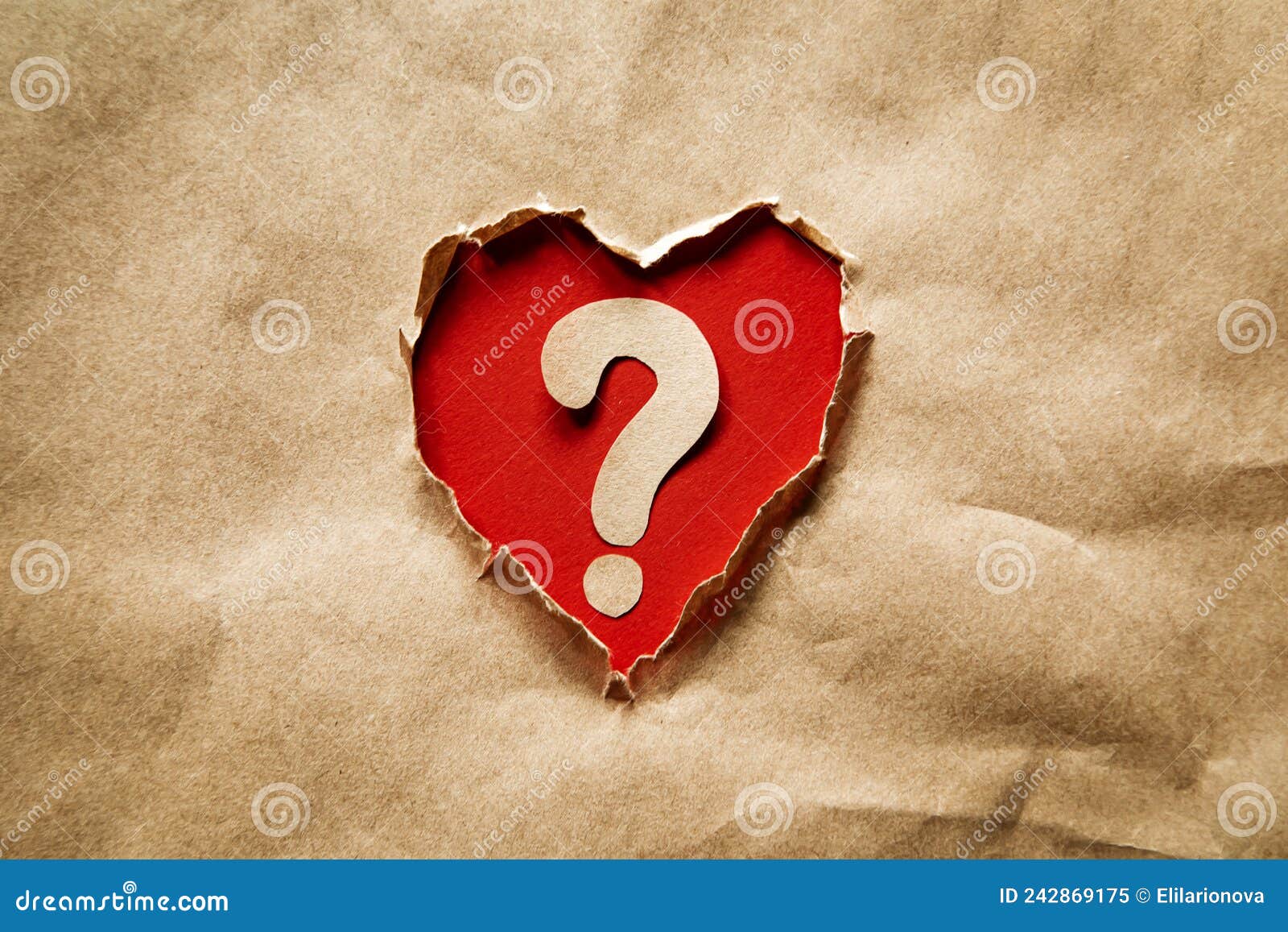 Heart Shaped Hole in Kraft Paper. Inside a Question Mark on a Red ...