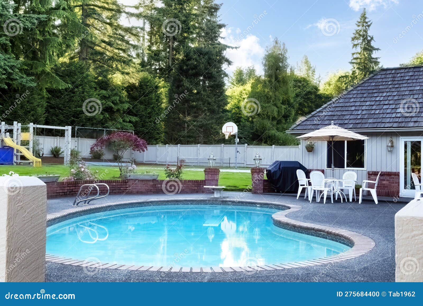 Heart Shaped Home Swimming Pool in Large Backyard Stock Photo - Image ...