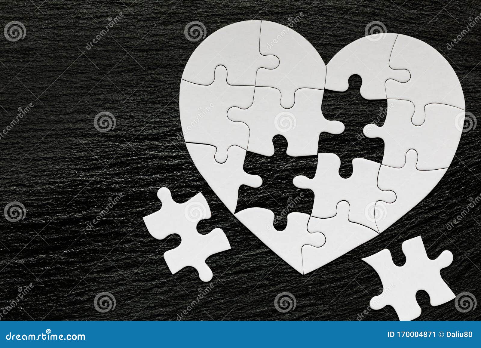 Heart-shaped Jigsaw Puzzle on Color Background. Puzzle Heart on Wooden ... Heart-shaped Jigsaw Puzzle on Color Background. Puzzle Heart on Wooden ...
