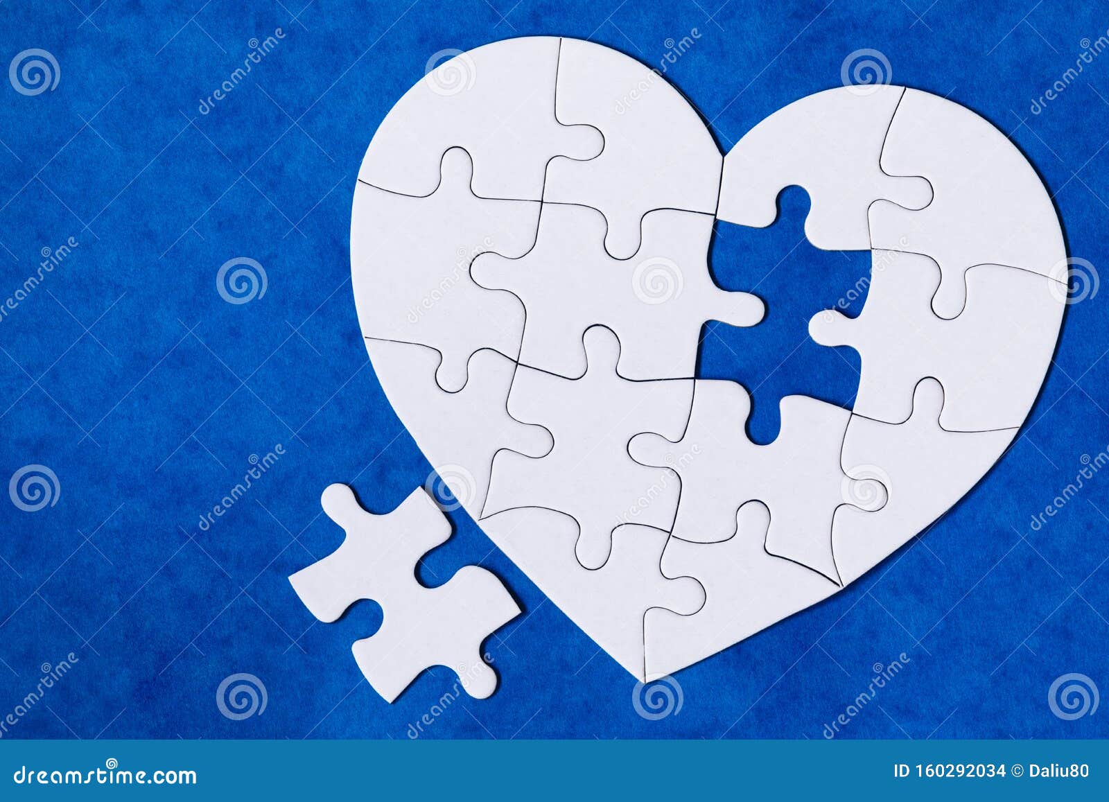 Heart-shaped Jigsaw Puzzle on Color Background. Puzzle Heart on Wooden ... Heart-shaped Jigsaw Puzzle on Color Background. Puzzle Heart on Wooden ...