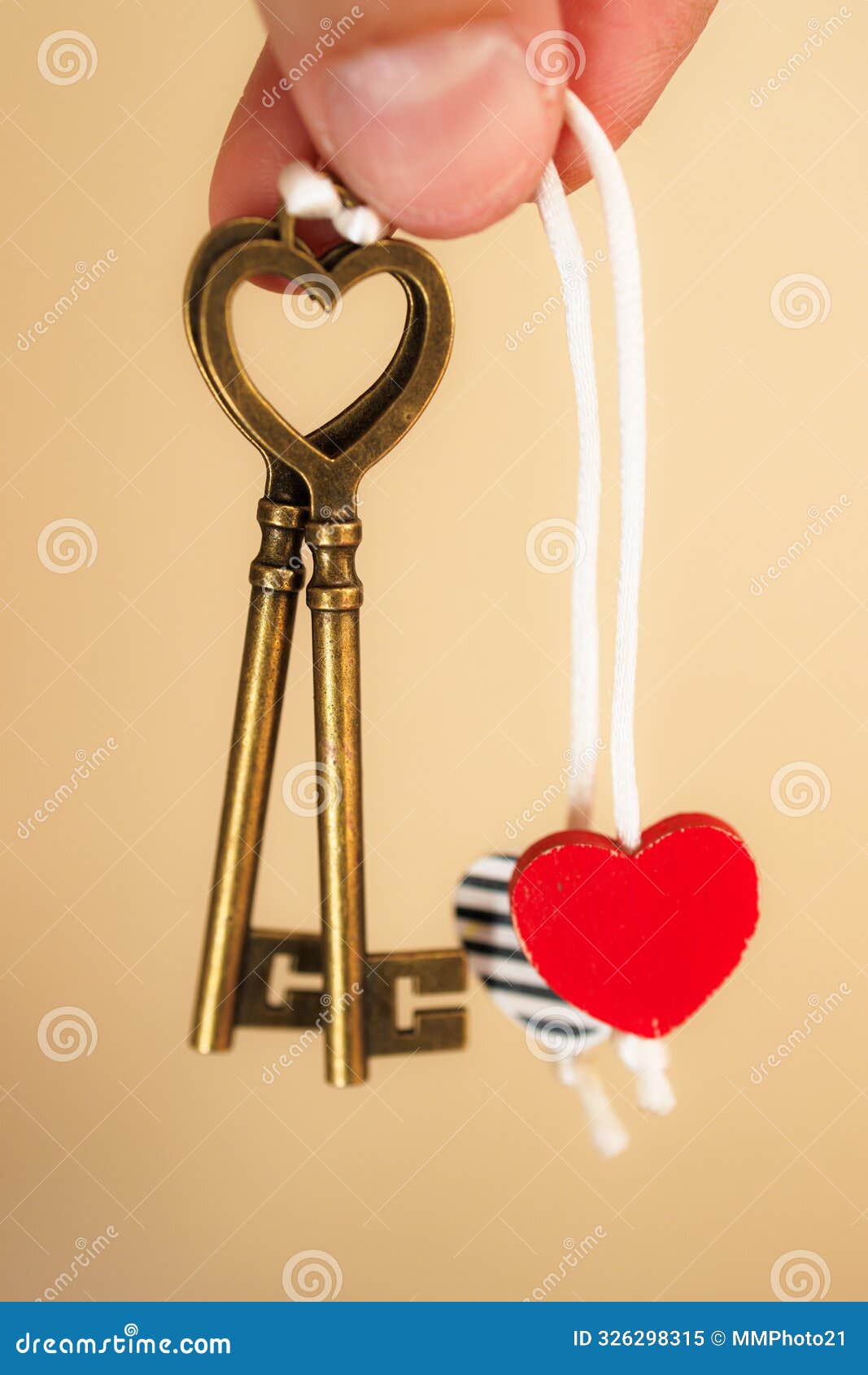 Heart-Shaped Vintage Skeletopn Keys and Heart Charms on String Being ...