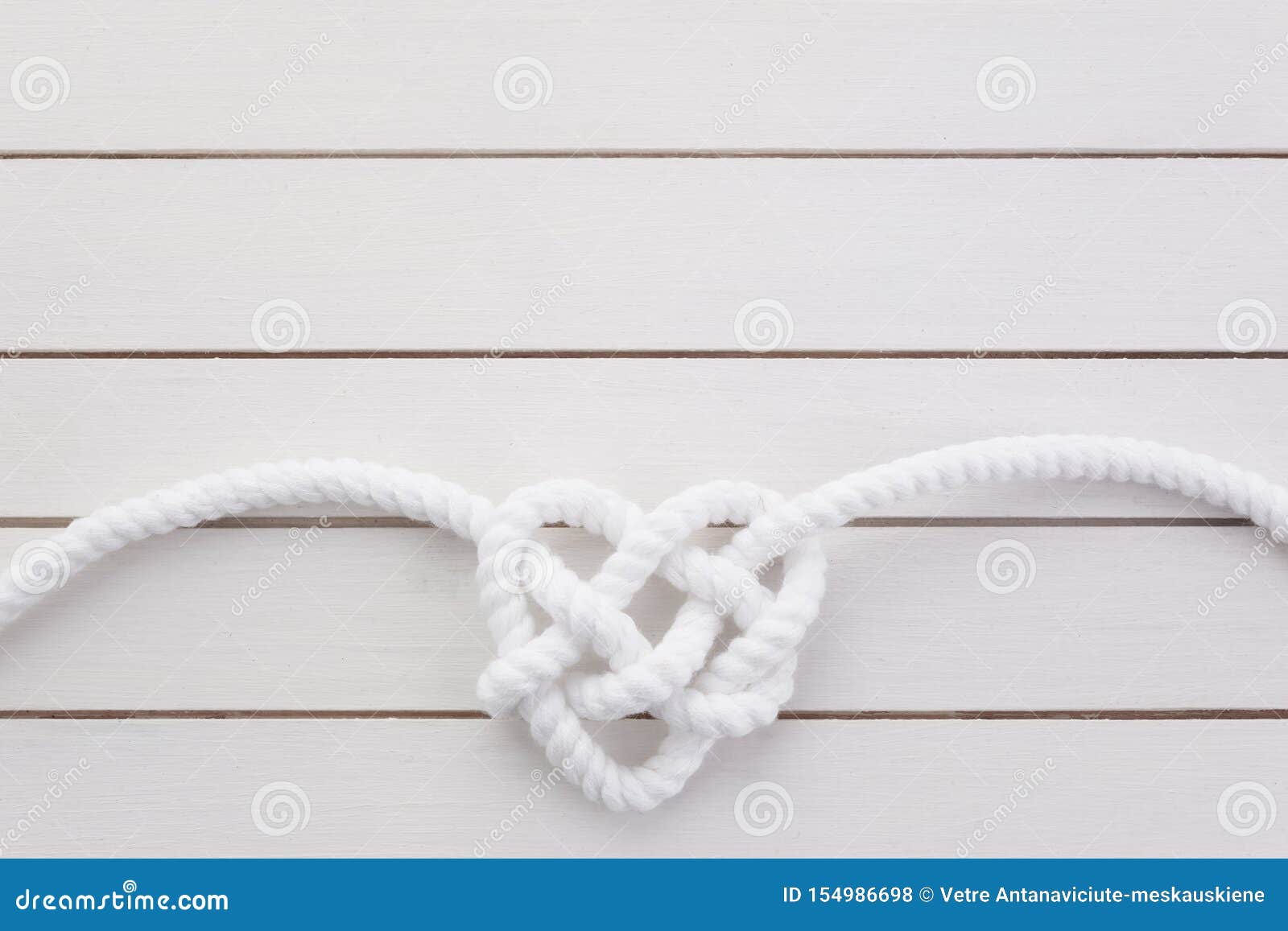 Heart Shaped Knot on White Wooden Background Stock Photo - Image of ...