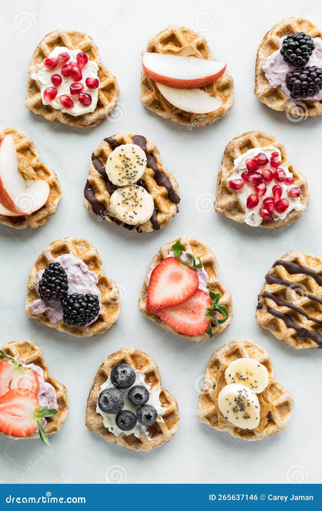 Heart Shaped Mini Waffles with Various Toppings Displayed in Rows ...