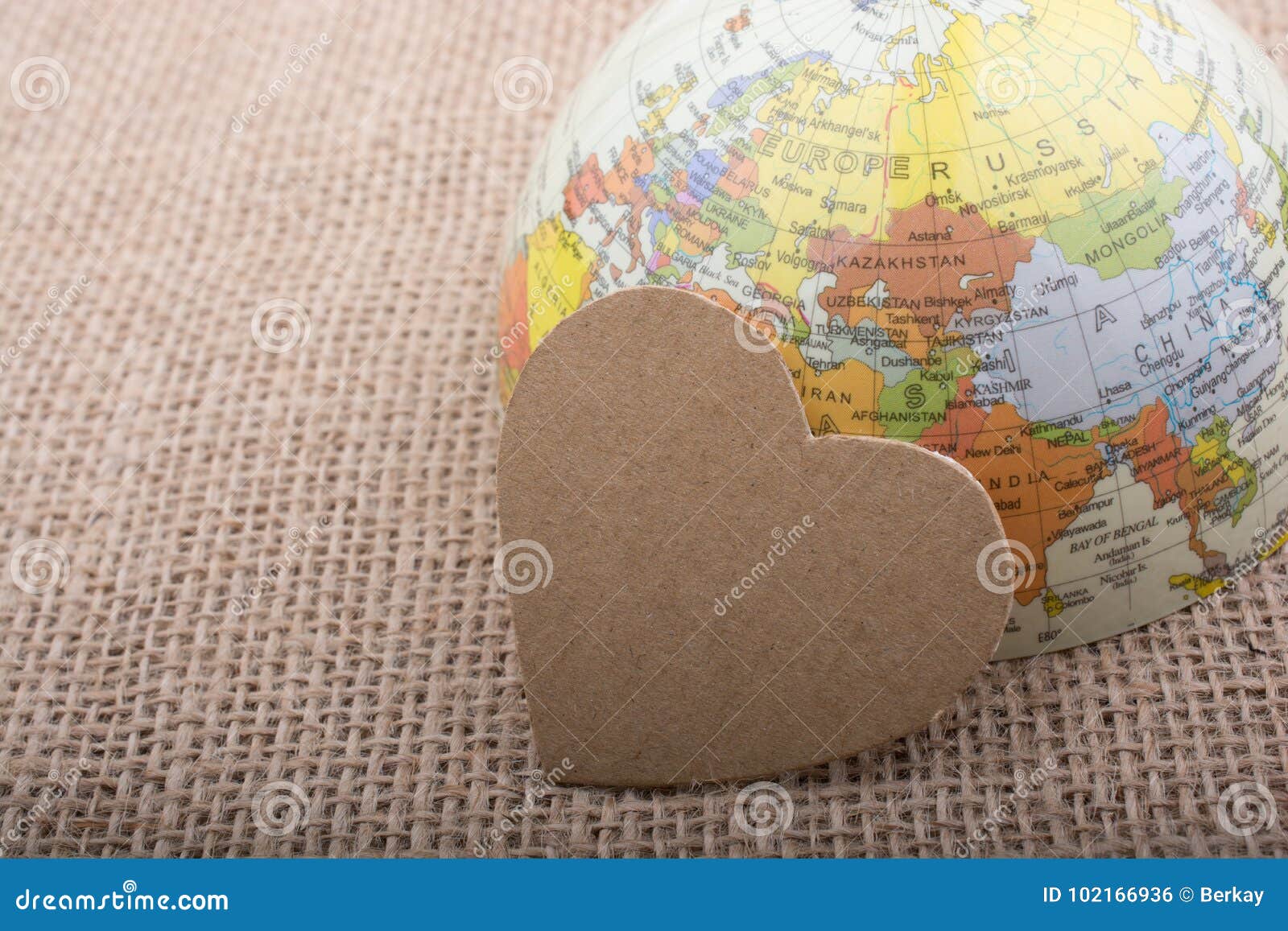 Heart Shaped Object by a Model Globe Stock Photo - Image of hearts ...