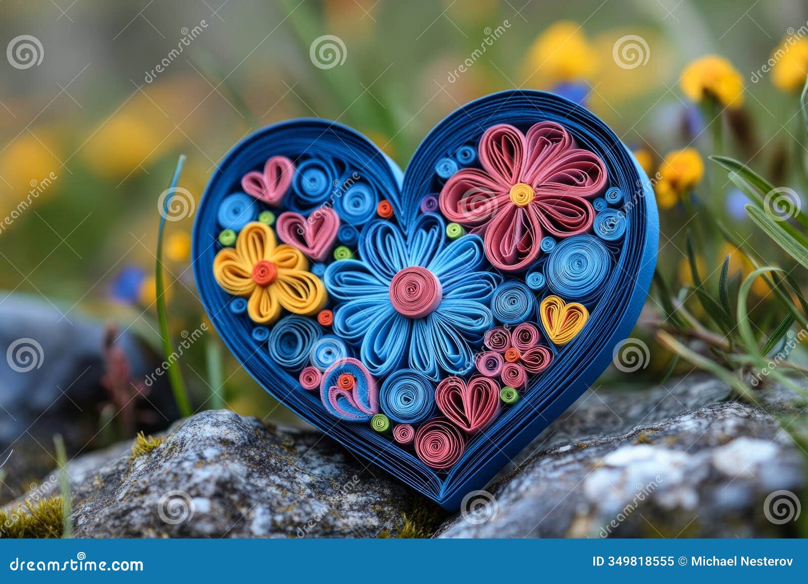 Heart Shaped Paper Quilling Decoration on a Rock Stock Image - Image of ...