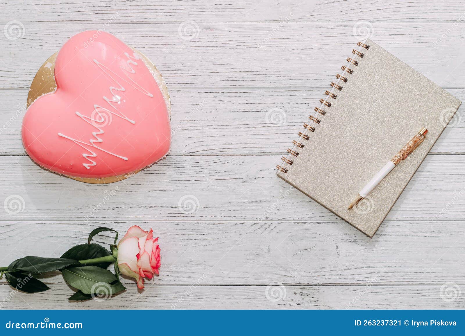 Heart Shaped Pink Mousse Cake on Table with Rose and Notepad. Stock ...