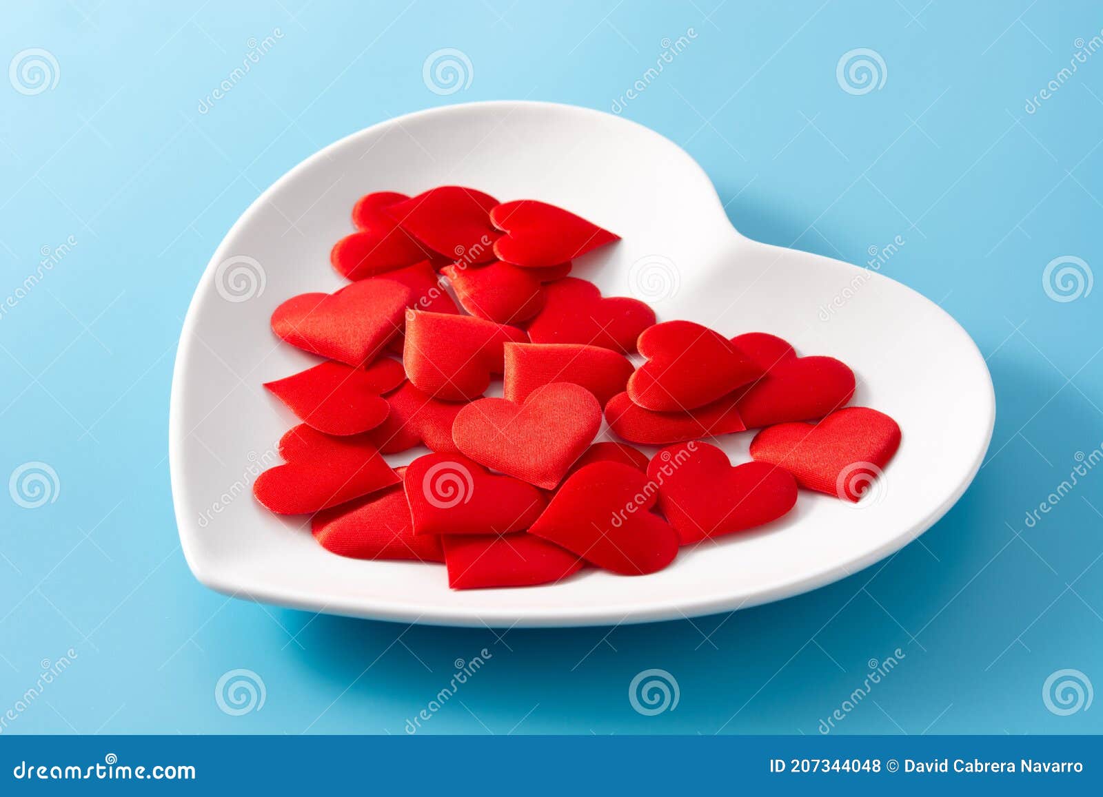 Heart Shaped Plate with Red Hearts Inside Stock Photo - Image of ...