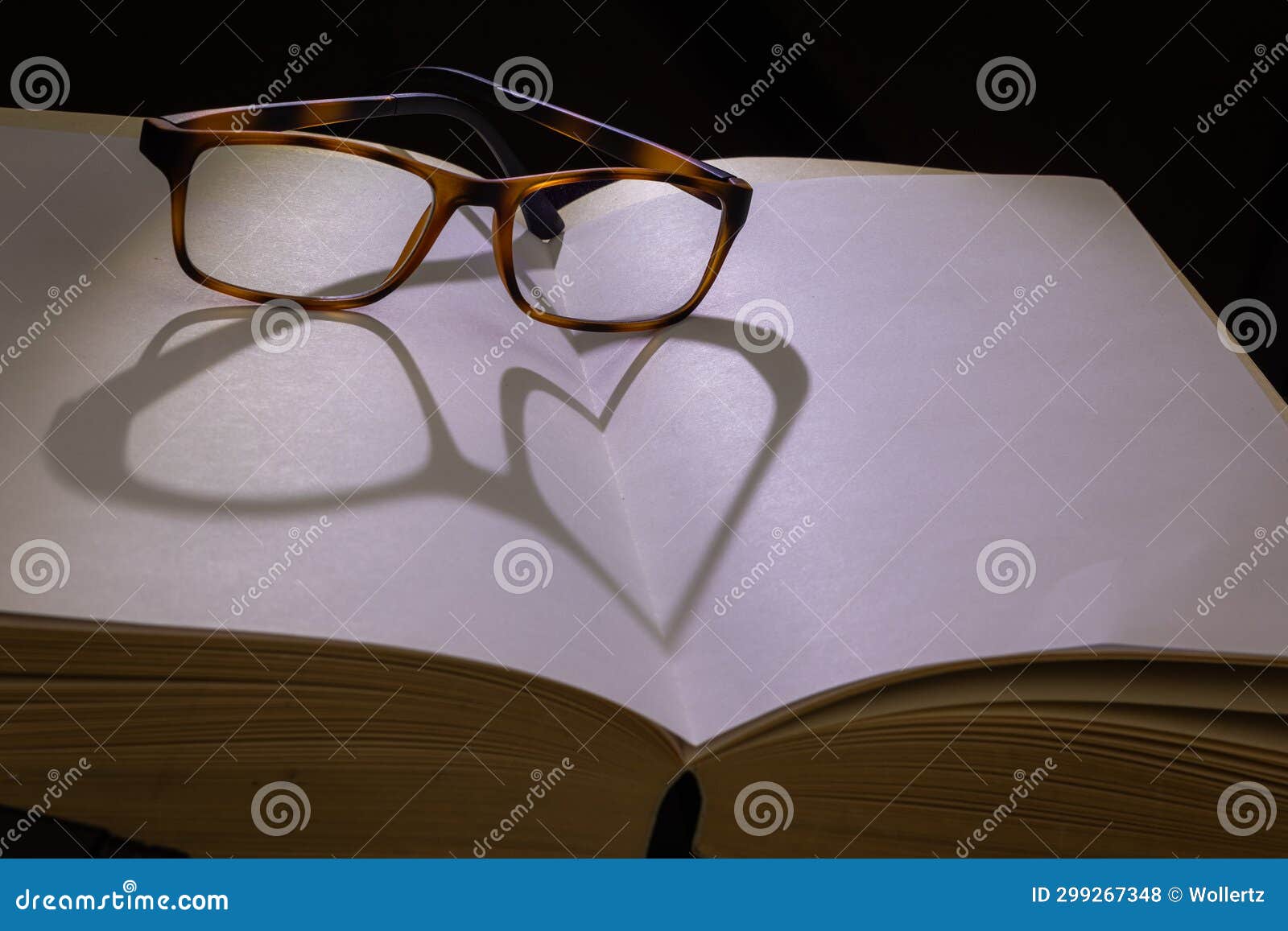 Heart Shaped Shadow from a Pair of Eye Glasses Stock Photo - Image of ...